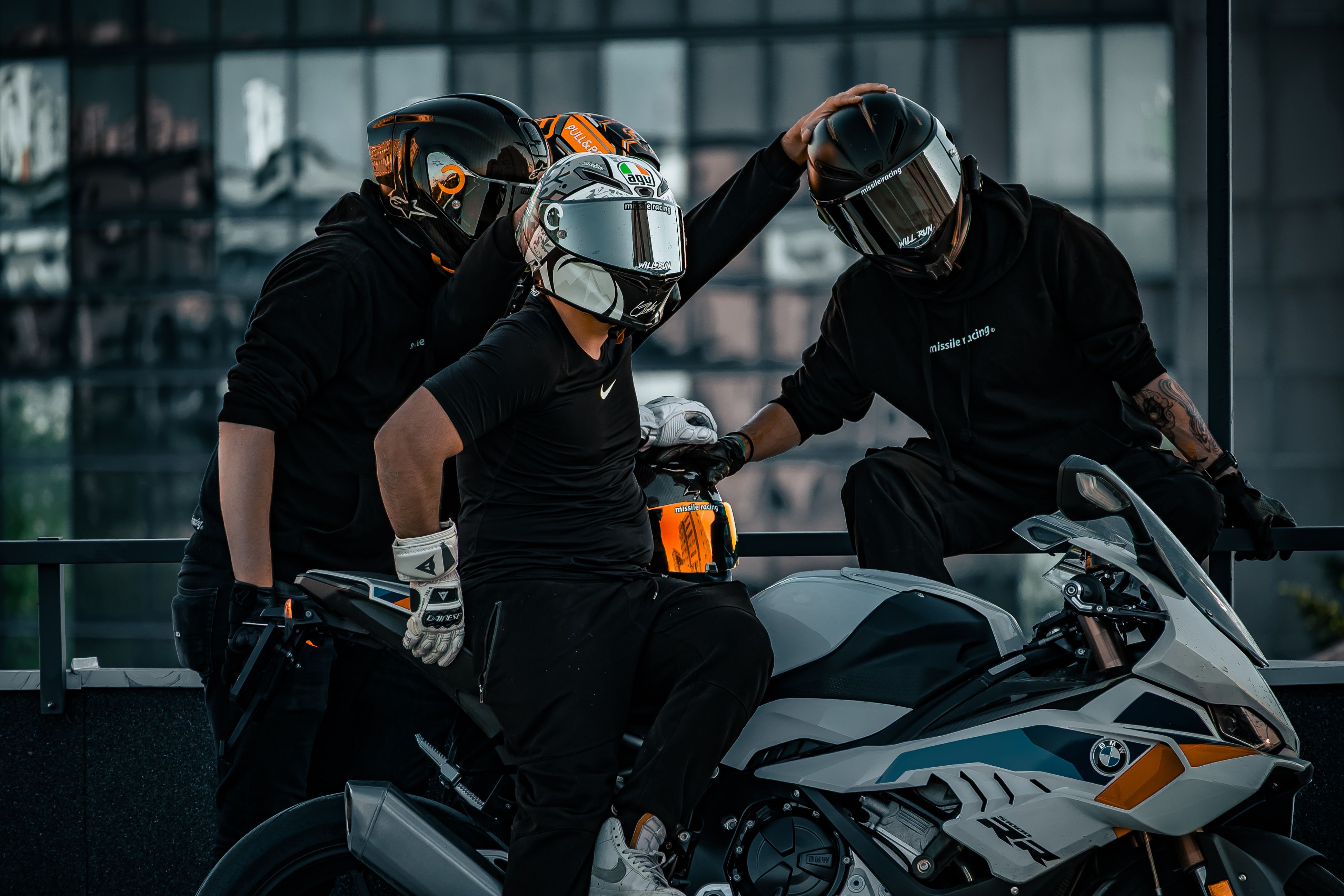 Group of Bikers with Helmets and Sport Bike · Free Stock Photo