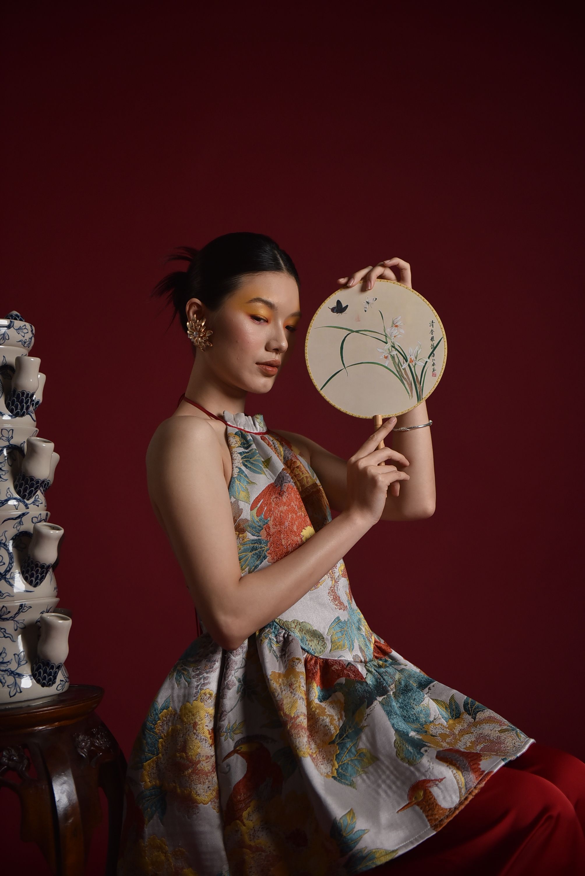 Elegant Portrait with Traditional Asian Fan · Free Stock Photo