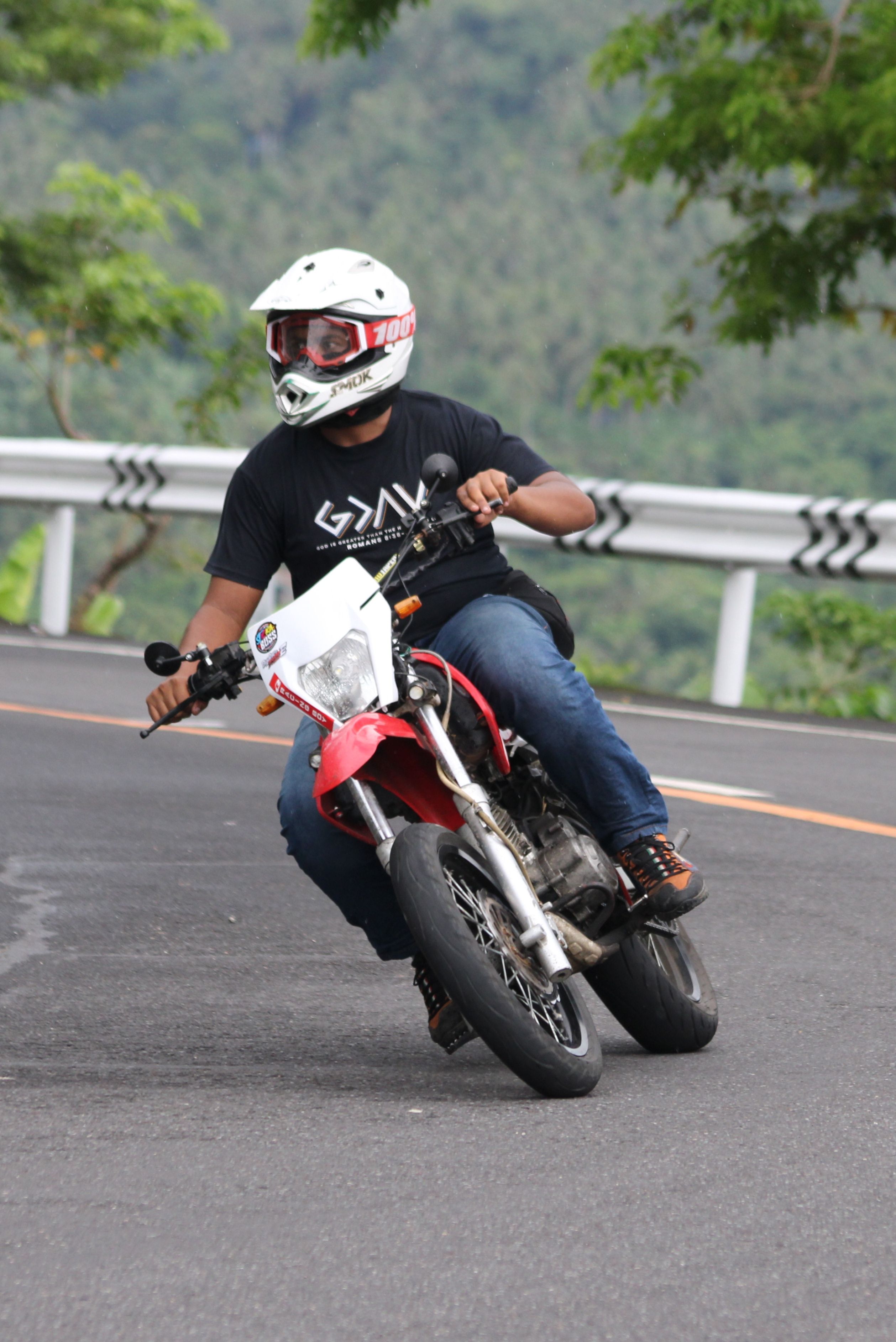 Thrilling Motorcycle Ride on Winding Road · Free Stock Photo