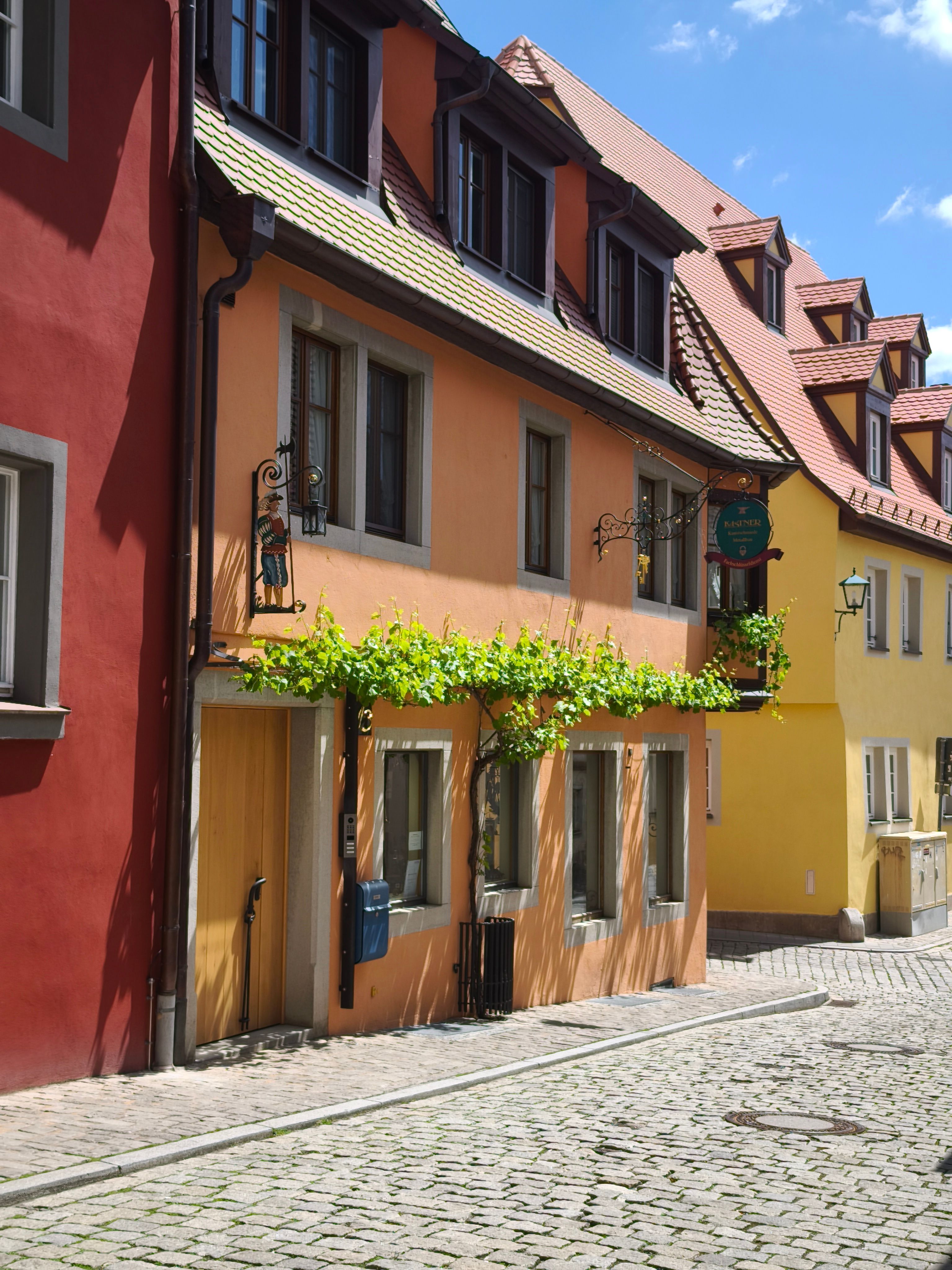 Colorful European Street with Historic Buildings · Free Stock Photo