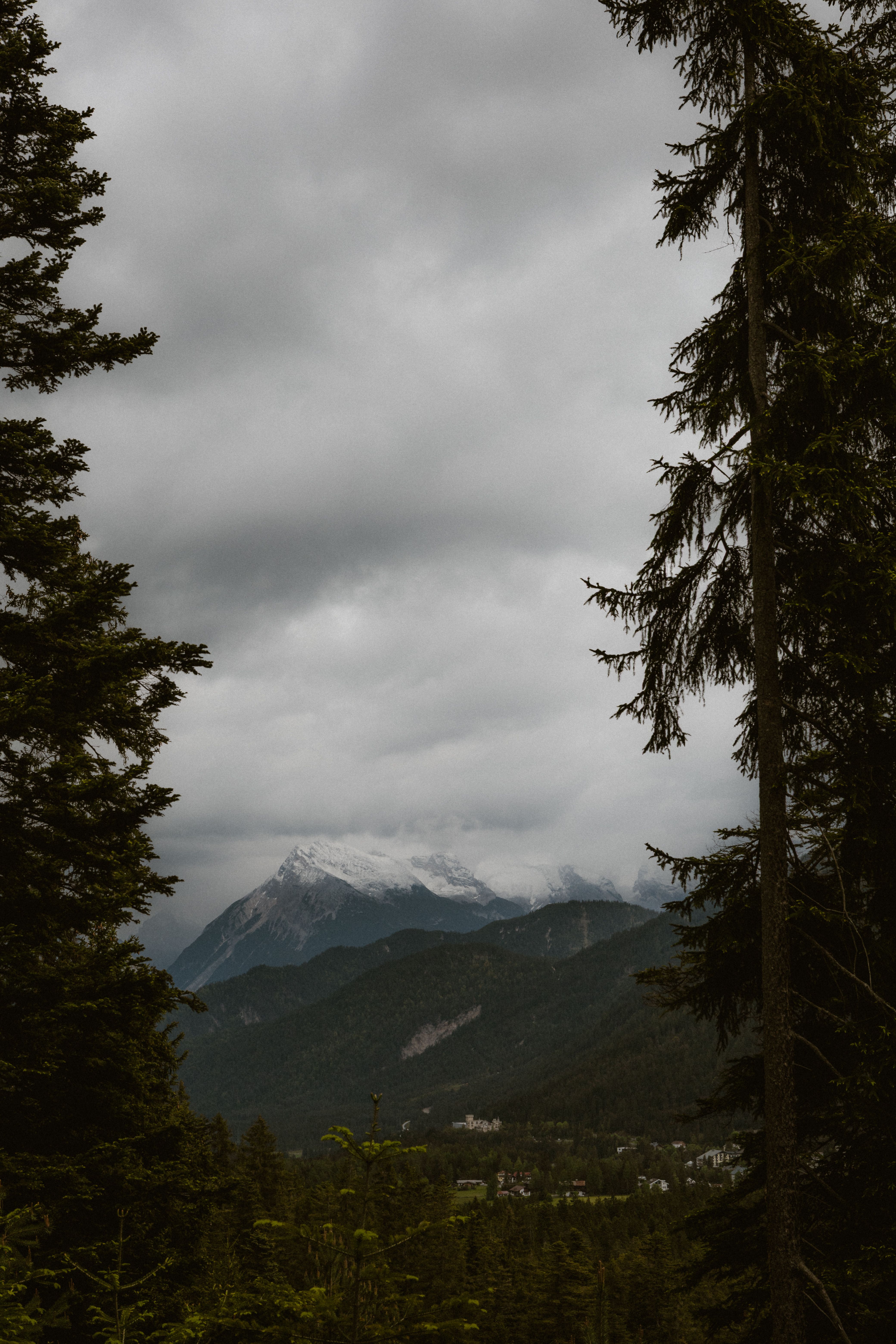 Serene Mountain Landscape Under Overcast Skies · Free Stock Photo