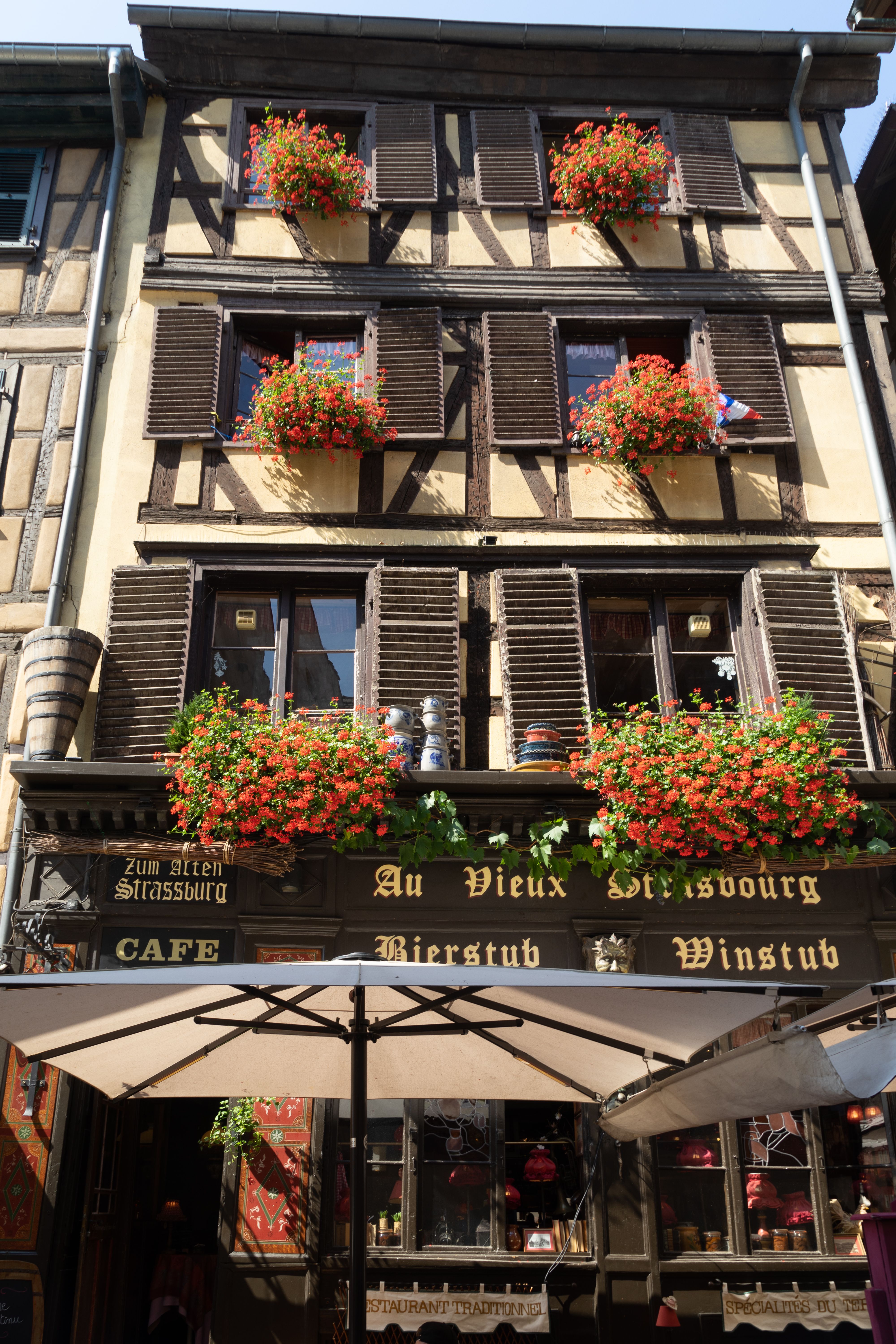 Charming Café Facade in Strasbourg, France · Free Stock Photo