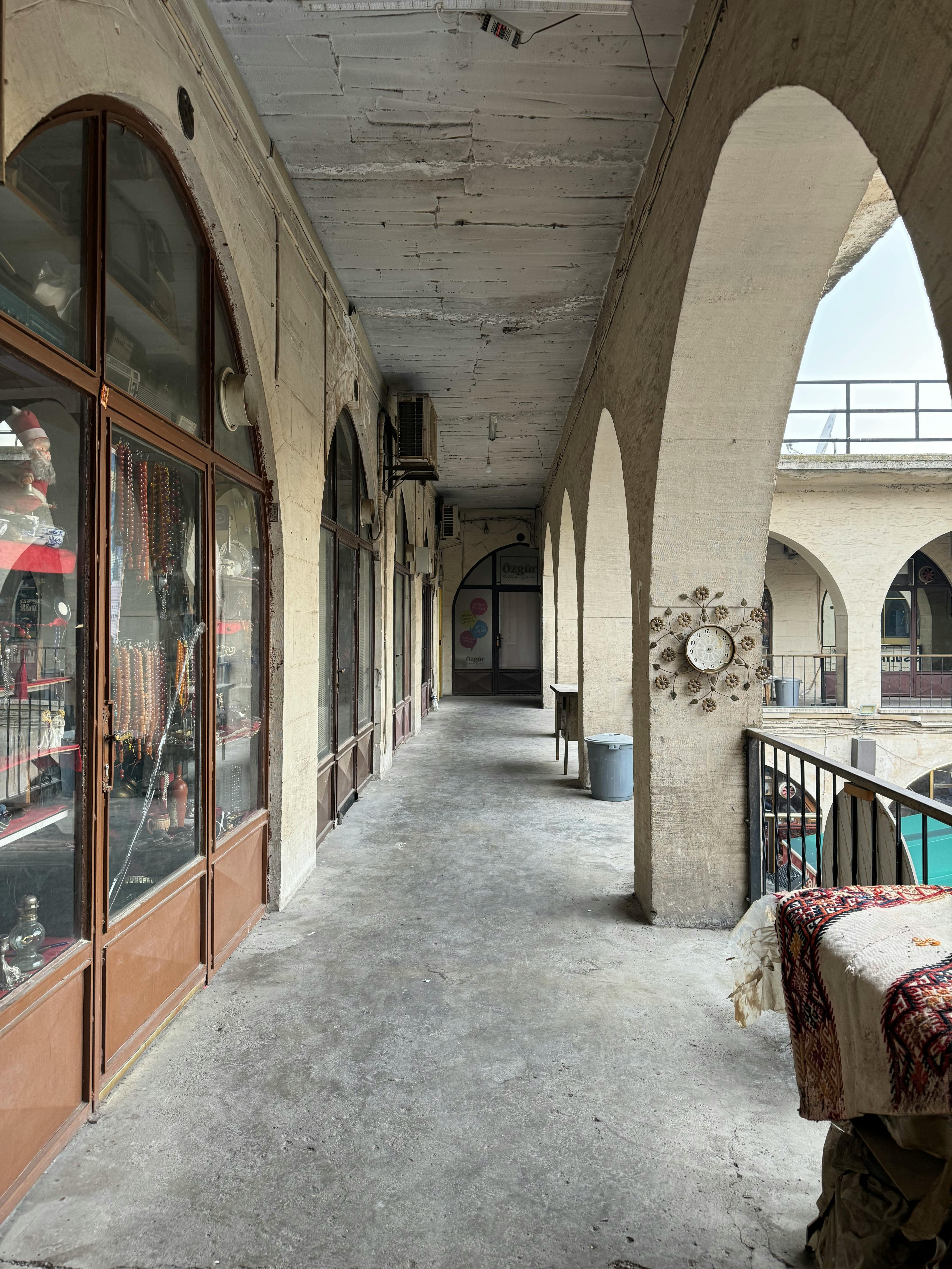 Historic Marketplace Corridor with Arched Architecture · Free Stock Photo