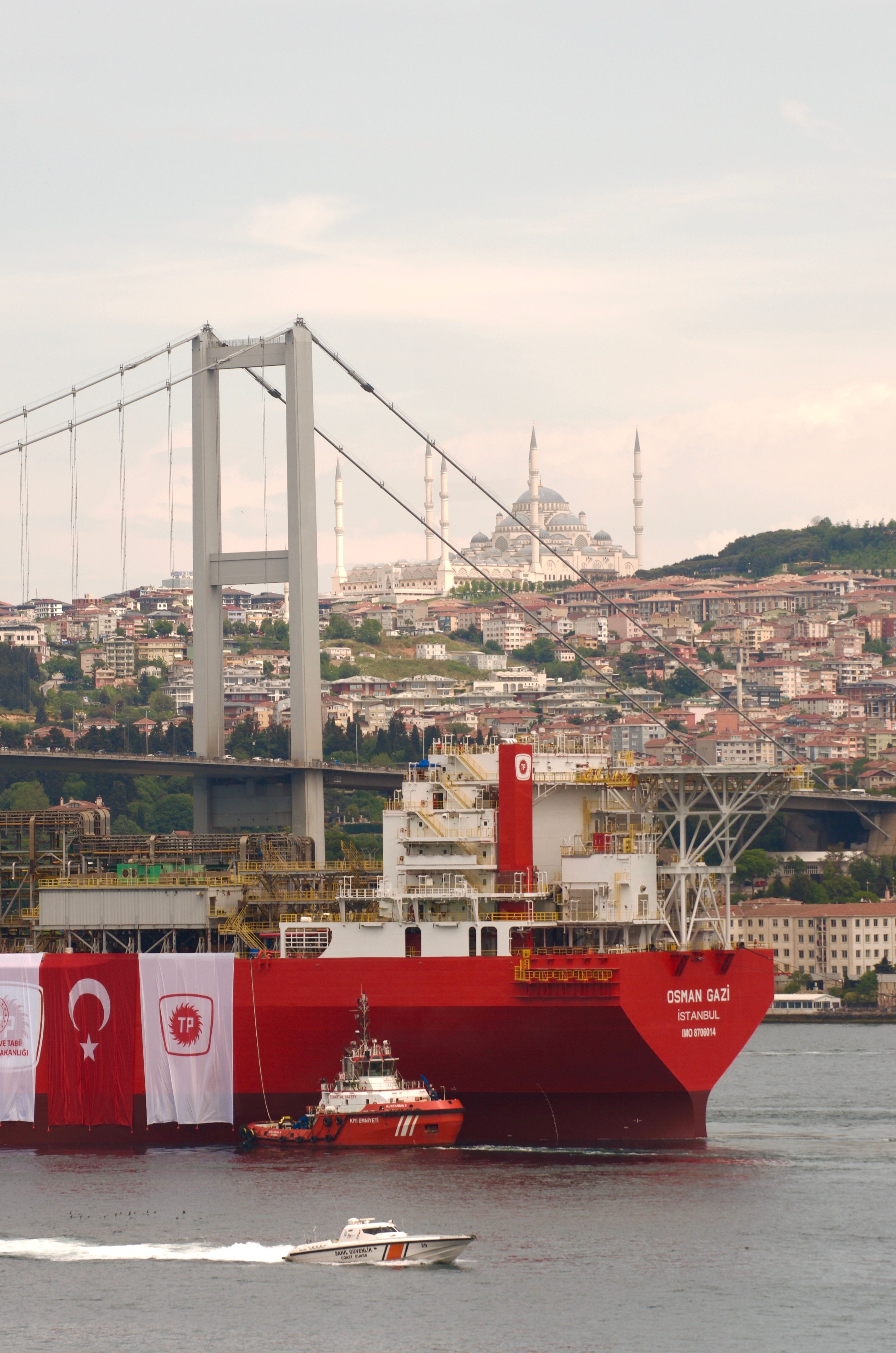 Cargo Ship in Bosphorus Strait with Istanbul Skyline · Free Stock Photo