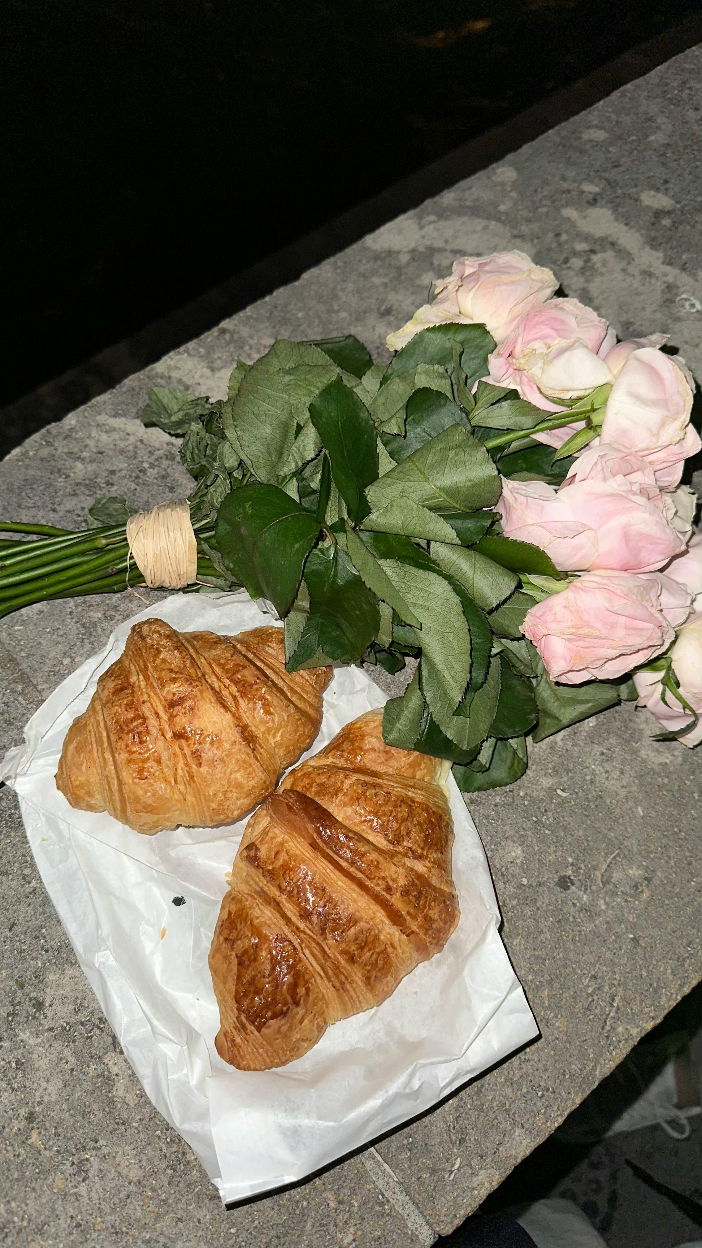 Delicious French Croissants with Pink Roses · Free Stock Photo