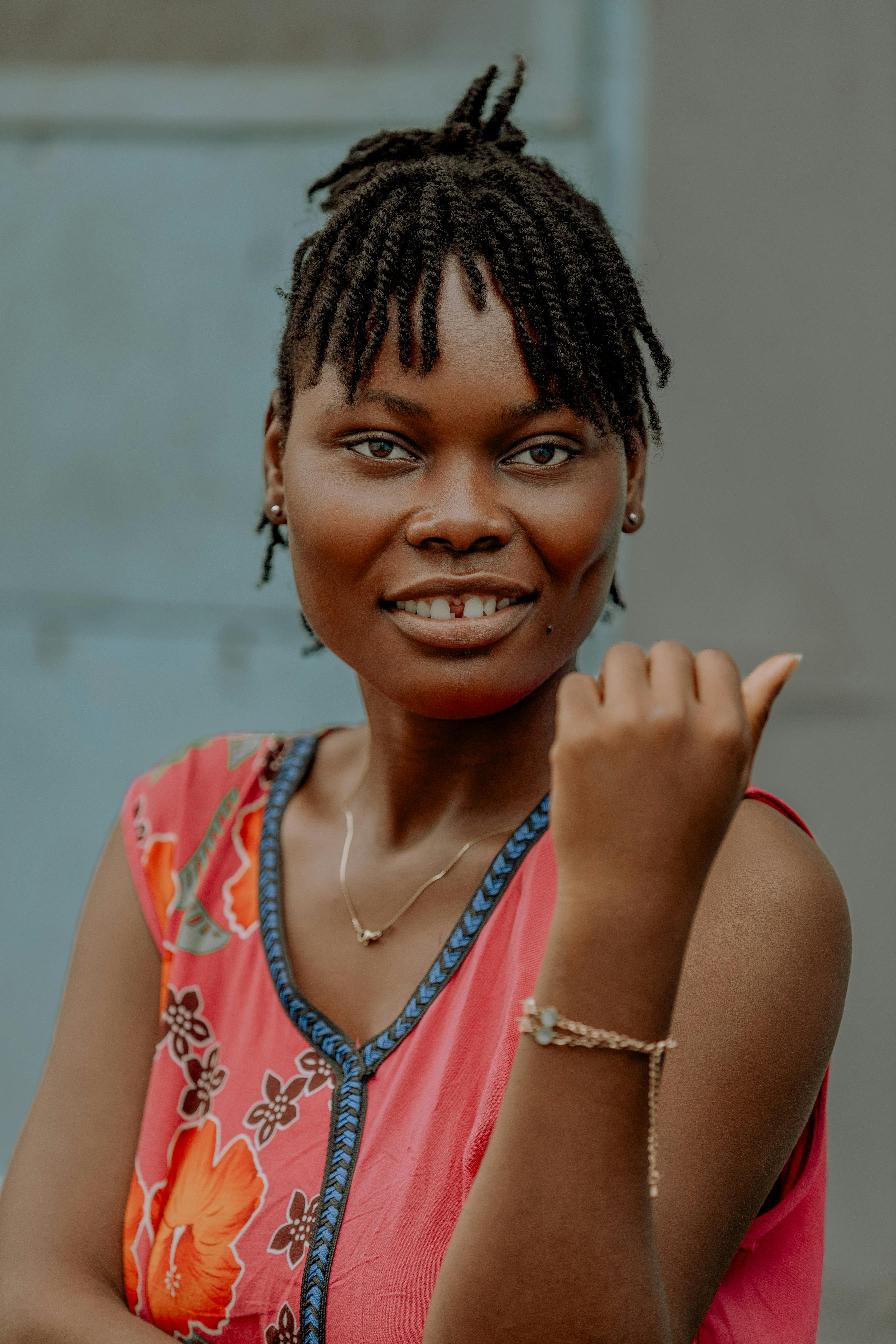 Elegant Portrait of a Stylish Young Woman Outdoors · Free Stock Photo