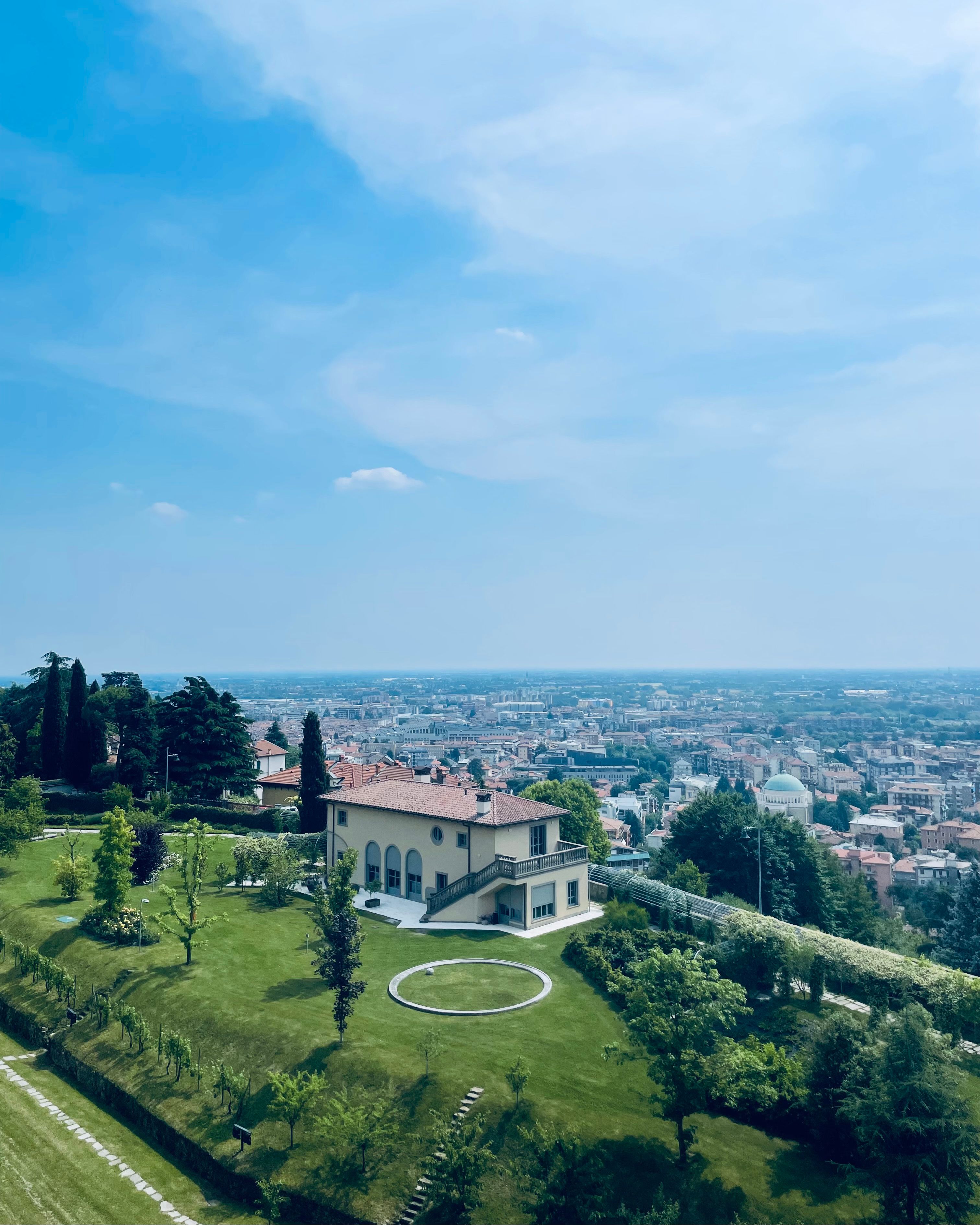 Aerial View of Scenic Hillside Villa with Cityscape · Free Stock Photo