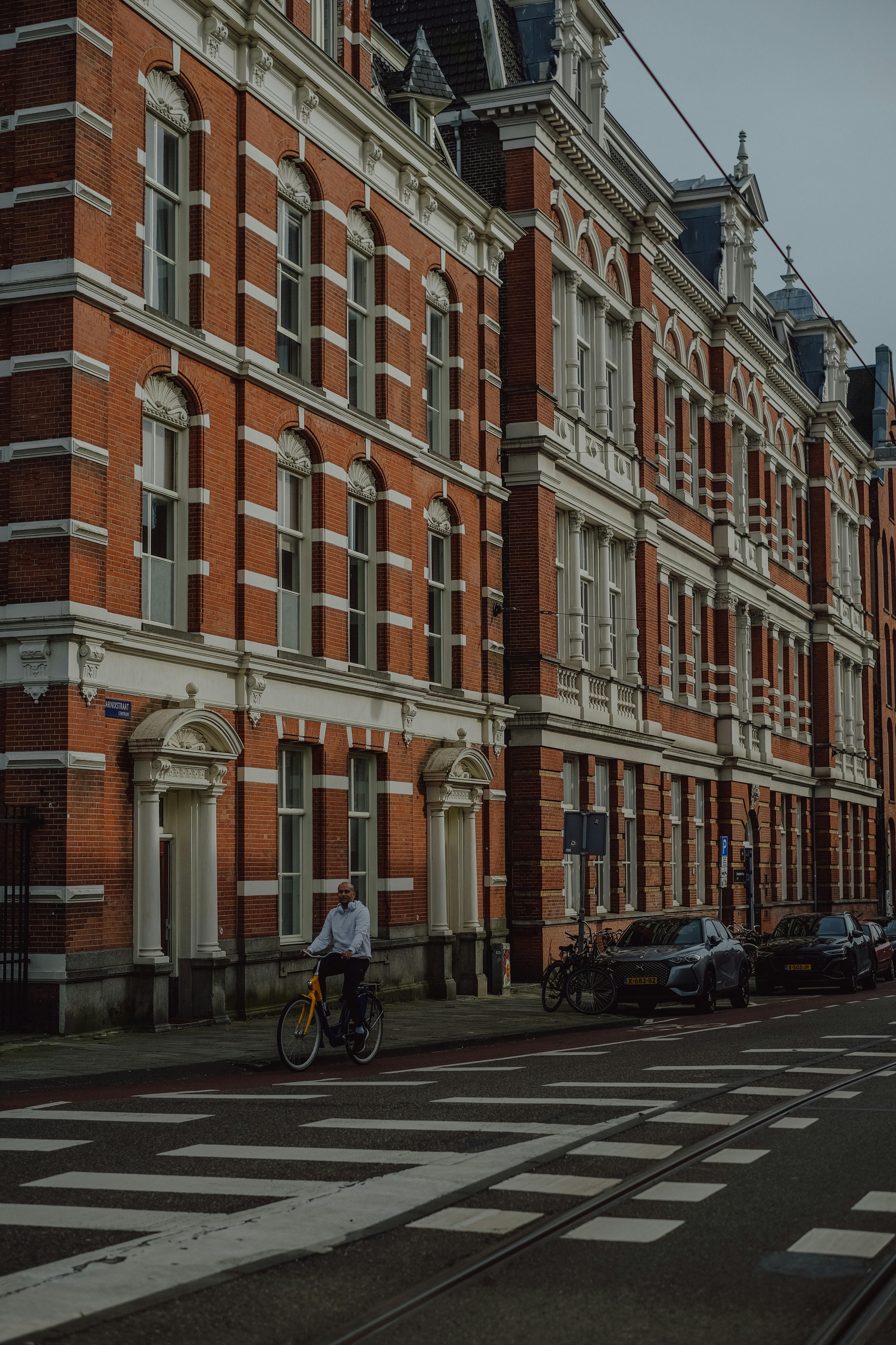 Elegant Historic Architecture in Amsterdam Street Scene · Free Stock Photo