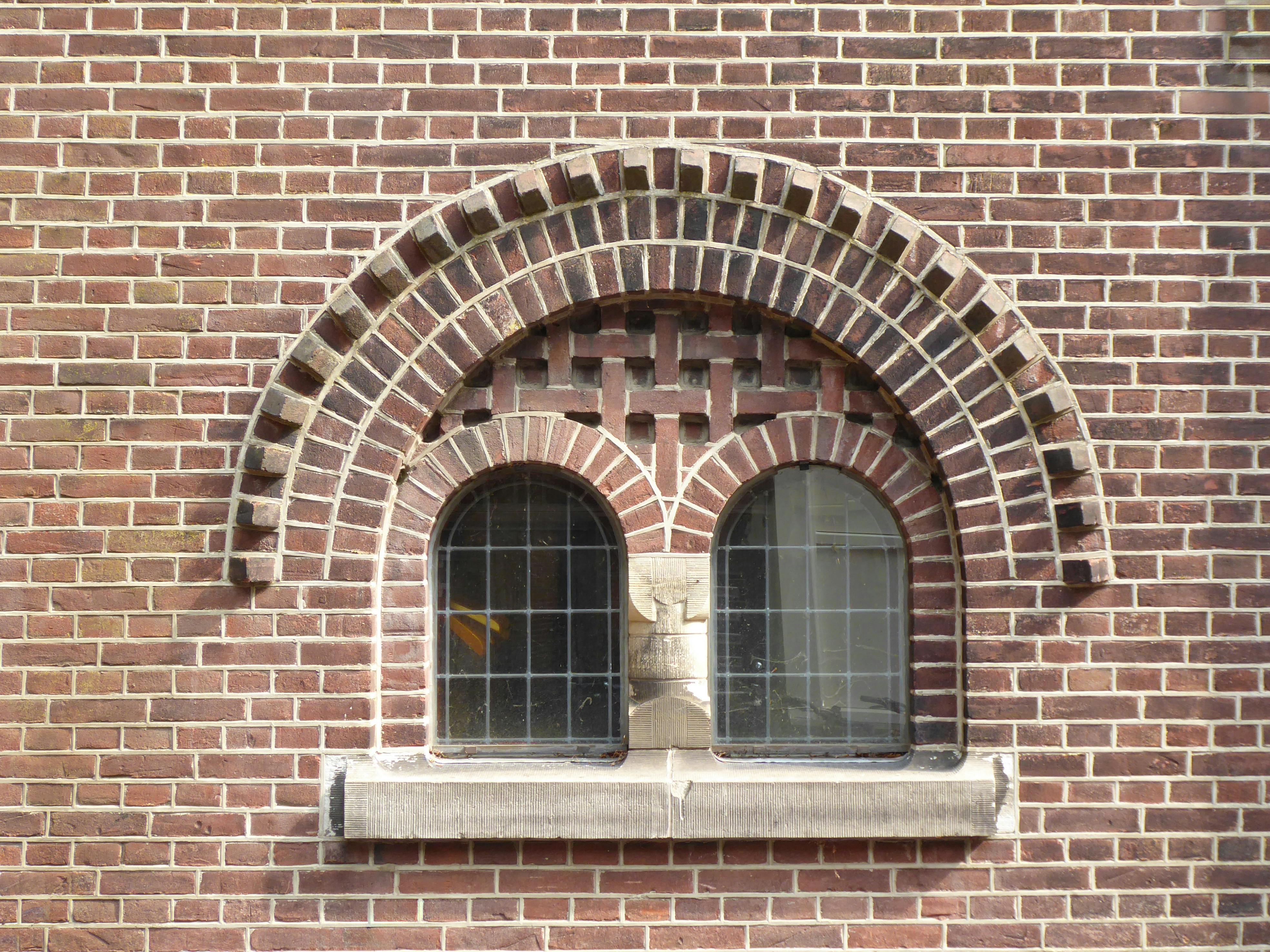 Arched Brick Window Frame with Pattern · Free Stock Photo