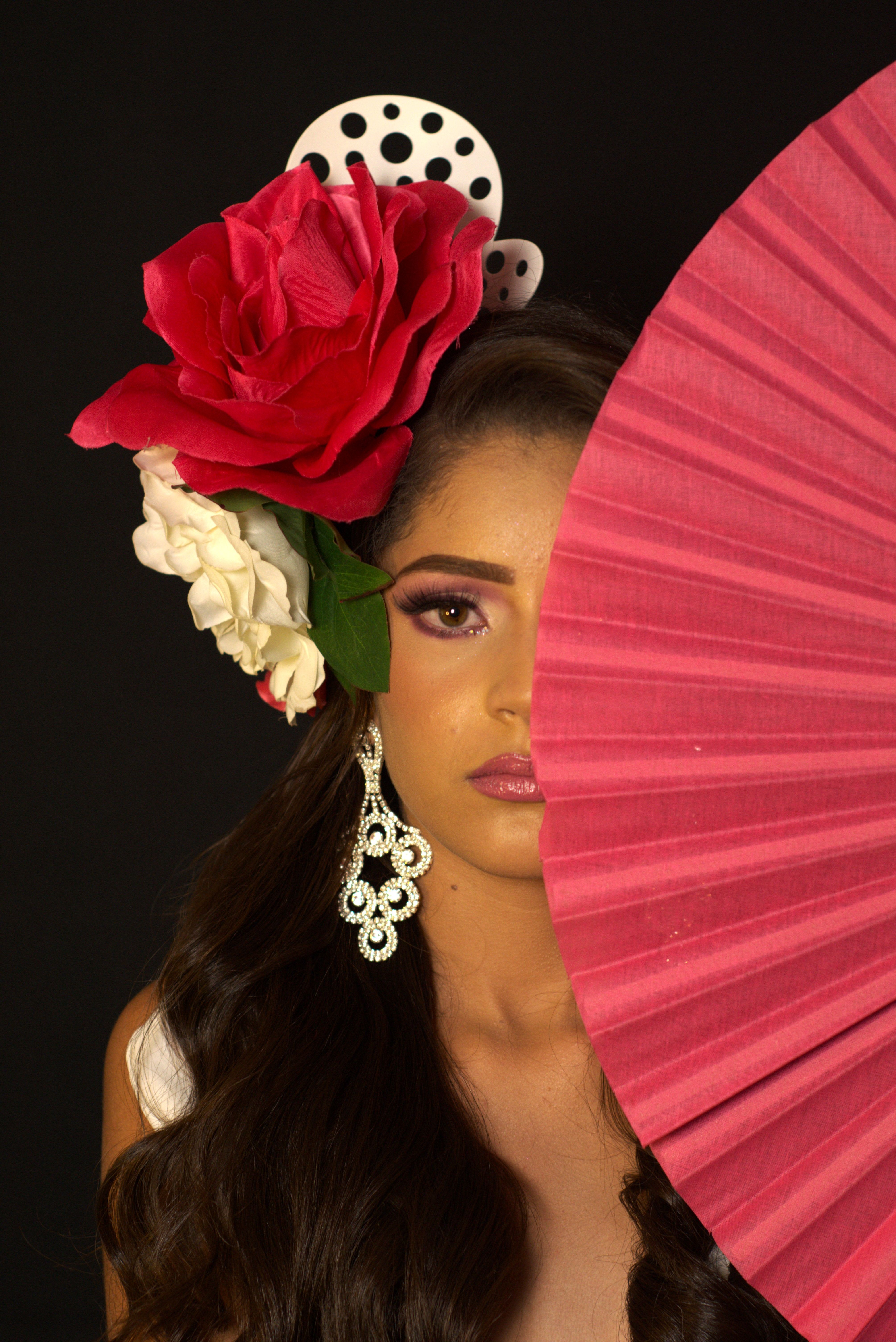 Elegant Portrait with Pink Fan and Floral Hairpiece · Free Stock Photo