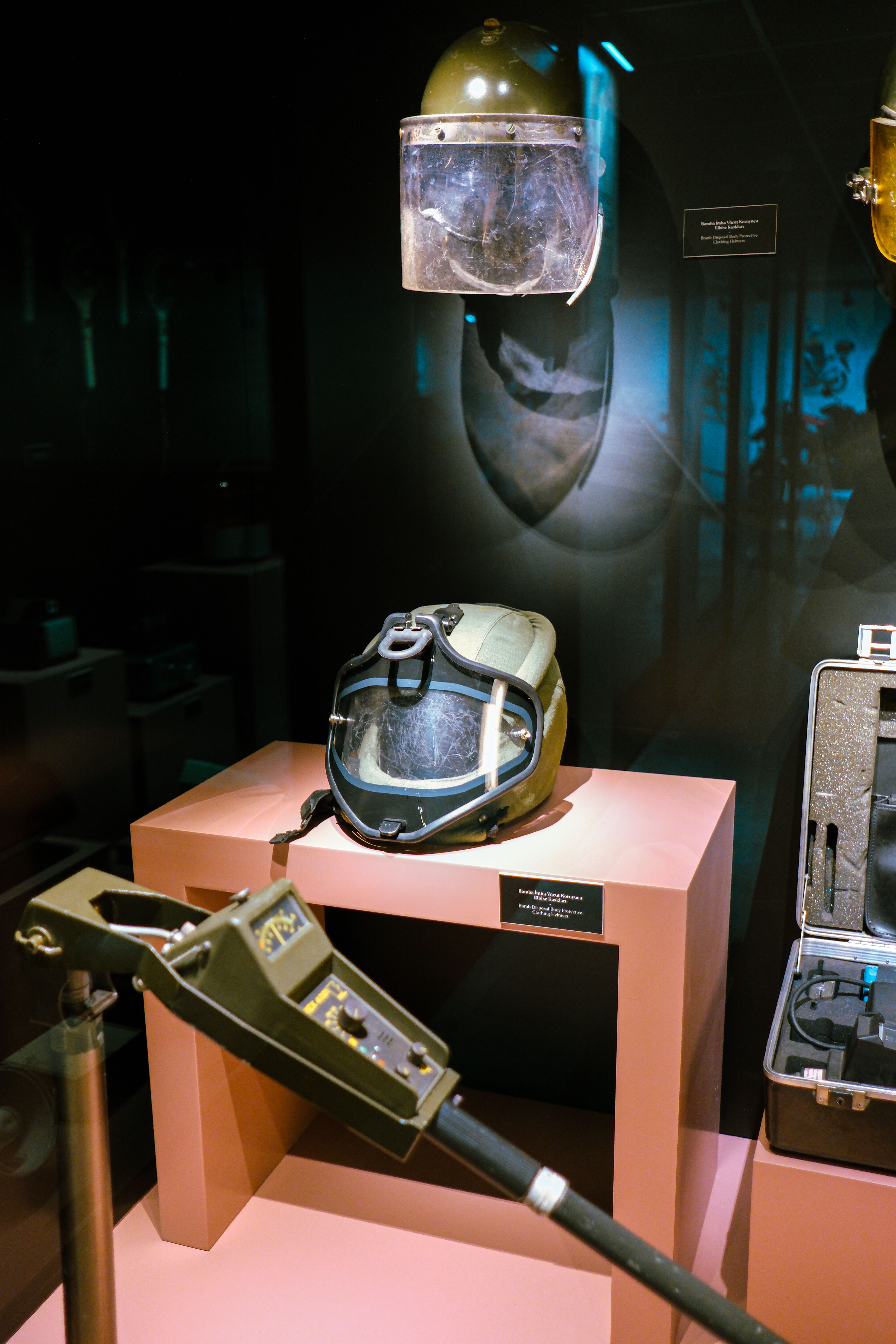 Museum Exhibit: Antique Helmets Display · Free Stock Photo