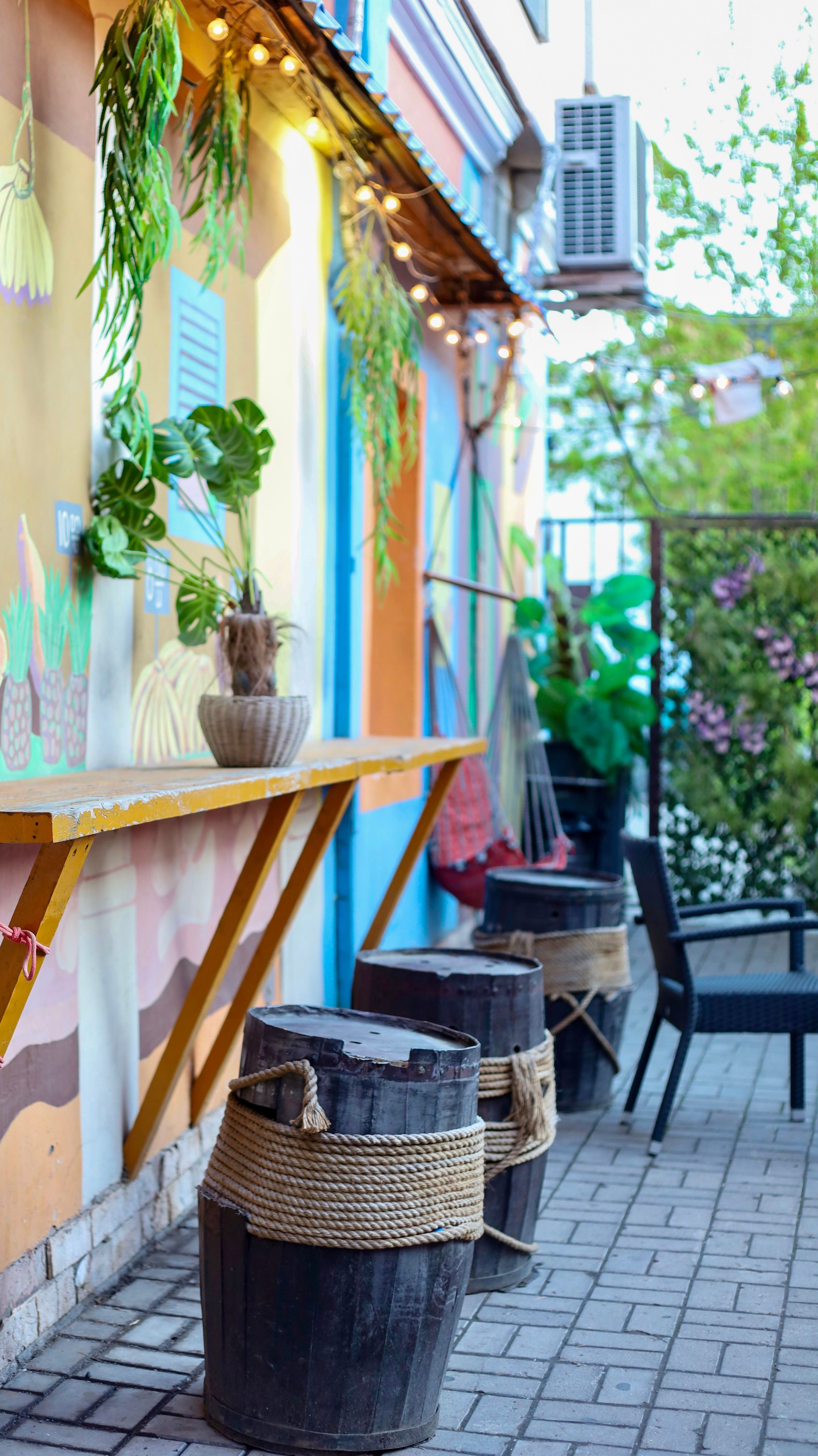 Cozy Outdoor Café Space with Creative Decor · Free Stock Photo