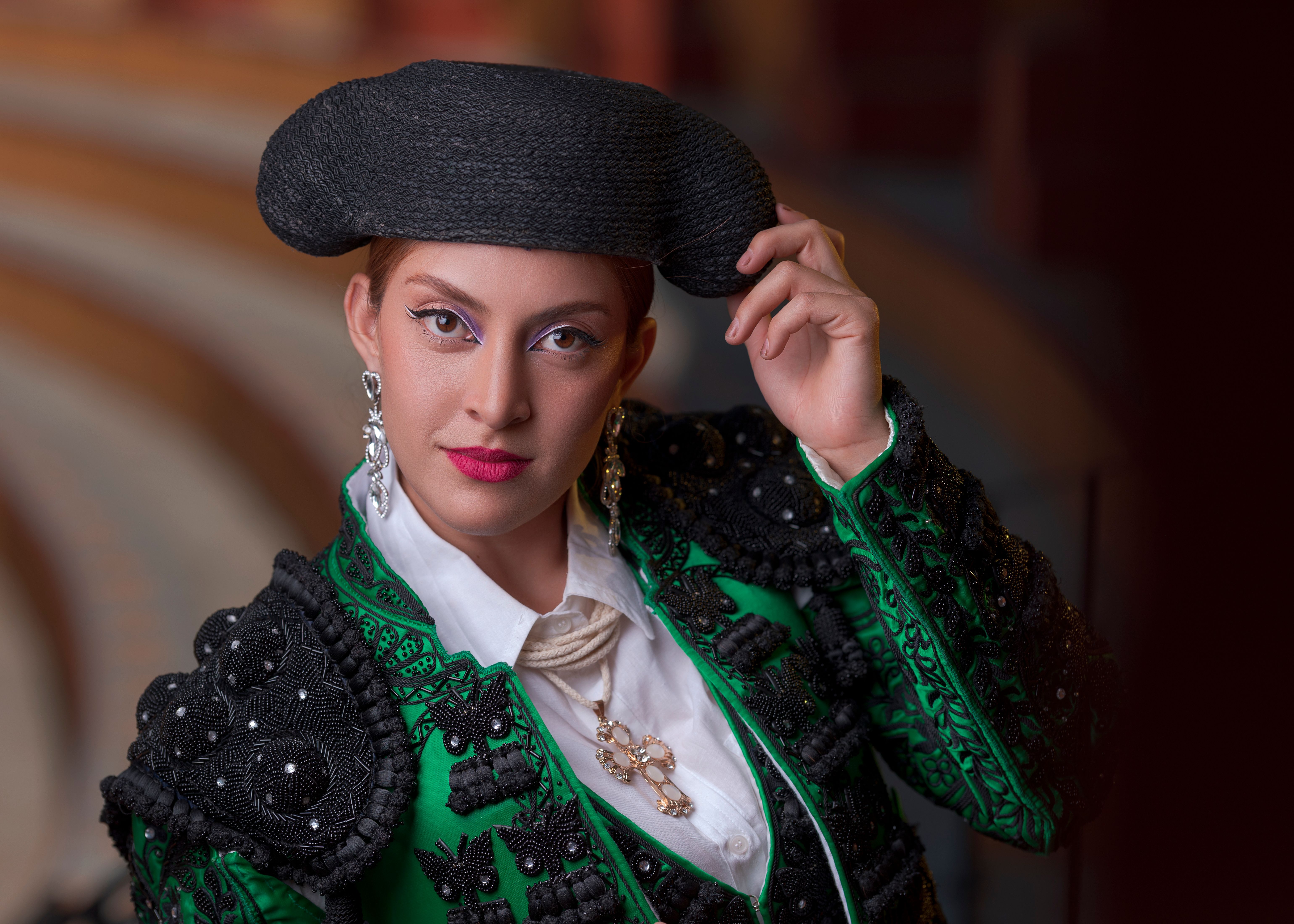 Portrait of a Woman in Traditional Matador Costume · Free Stock Photo