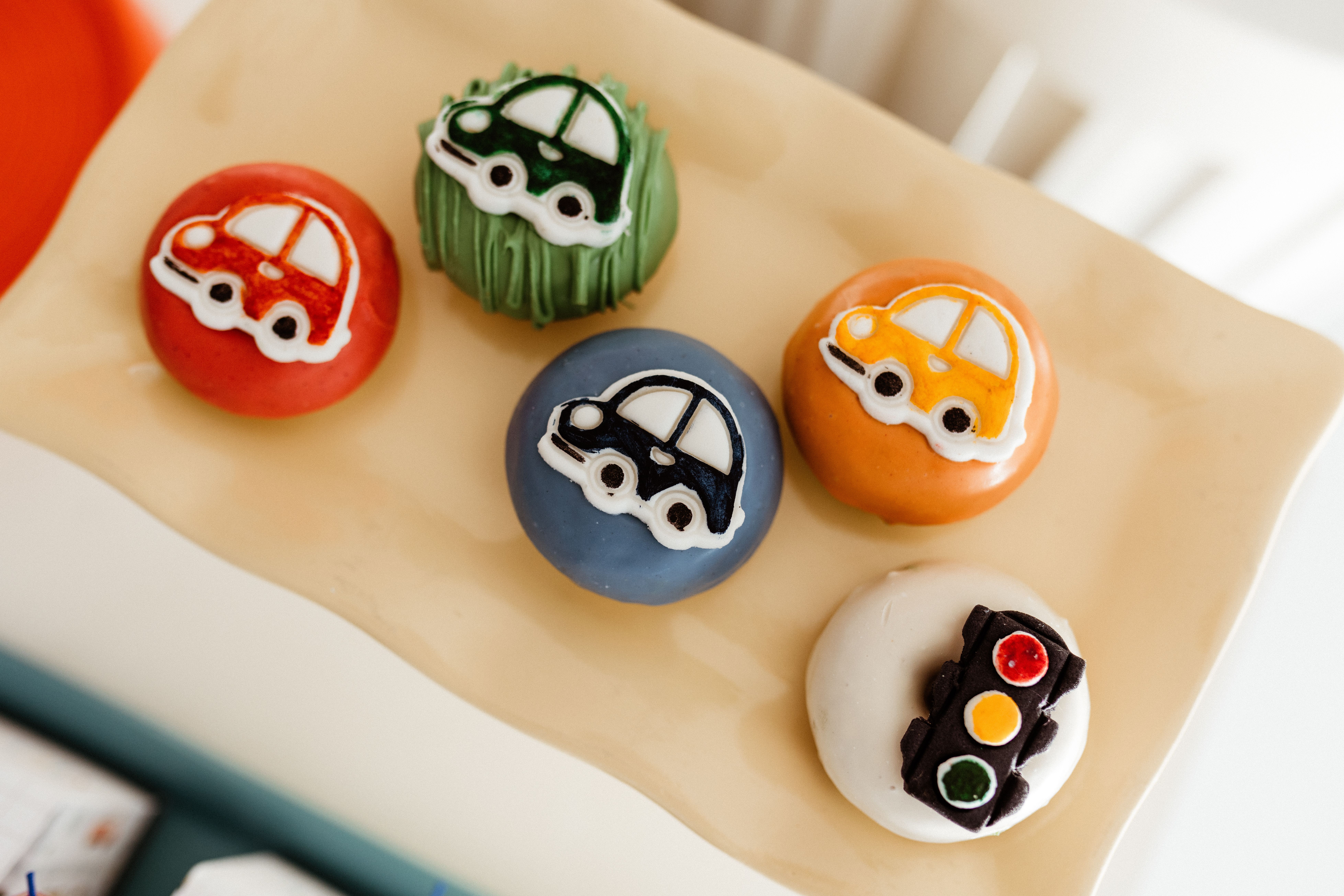Colorful Car-Themed Cupcakes on Display · Free Stock Photo