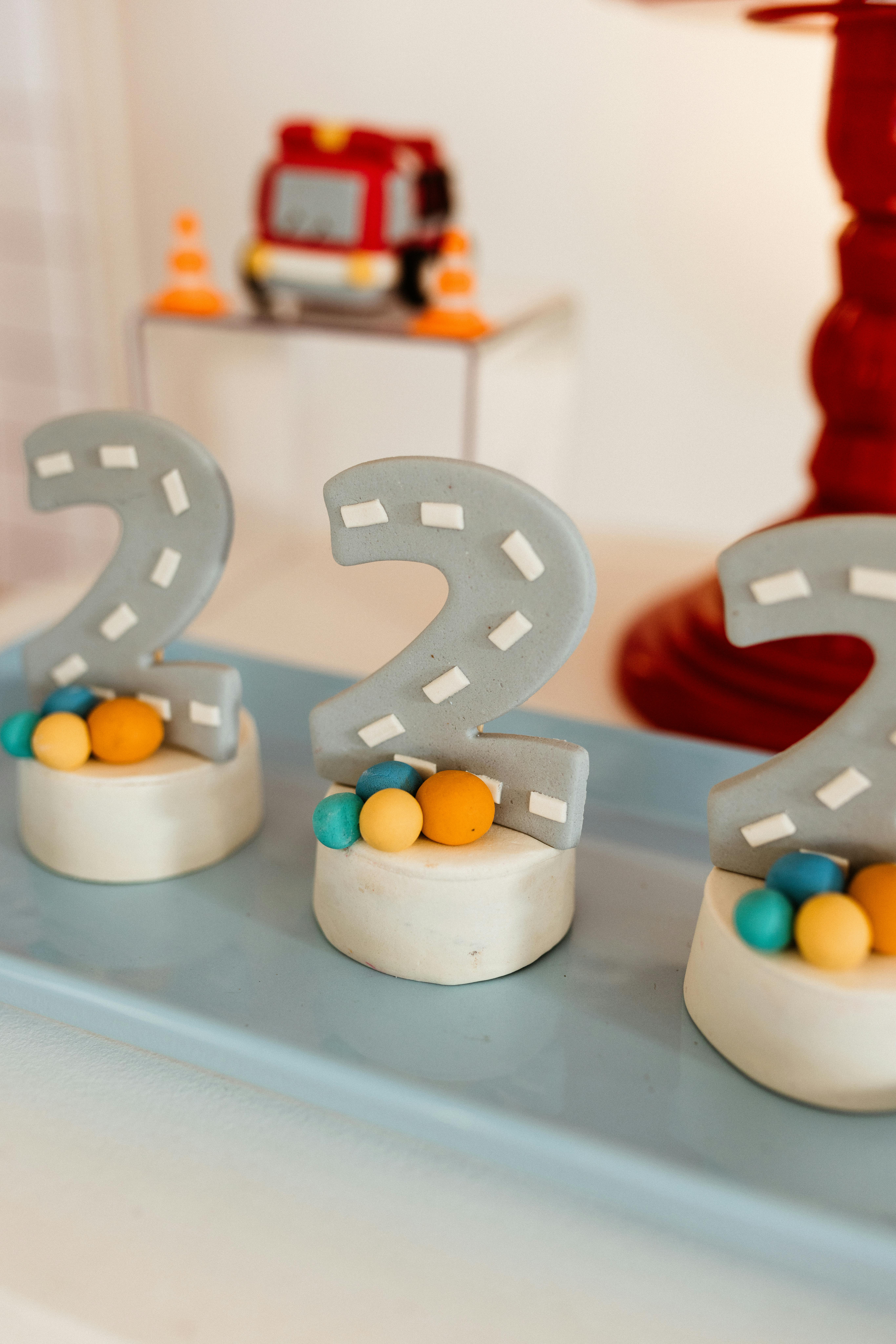 Playful Birthday Cake Decorations With Number 2 · Free Stock Photo