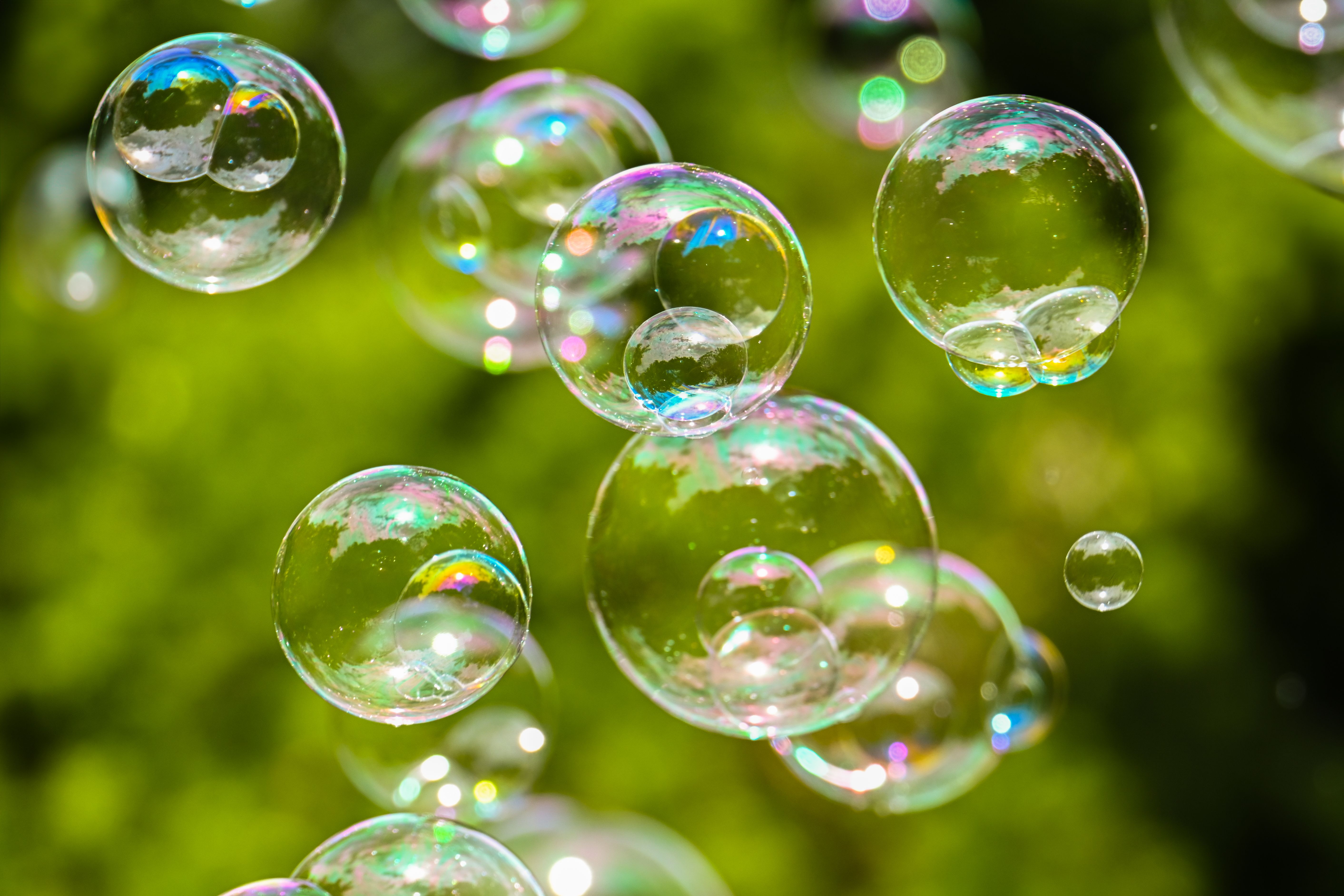 Floating Rainbow Iridescent Soap Bubbles Outdoors · Free Stock Photo