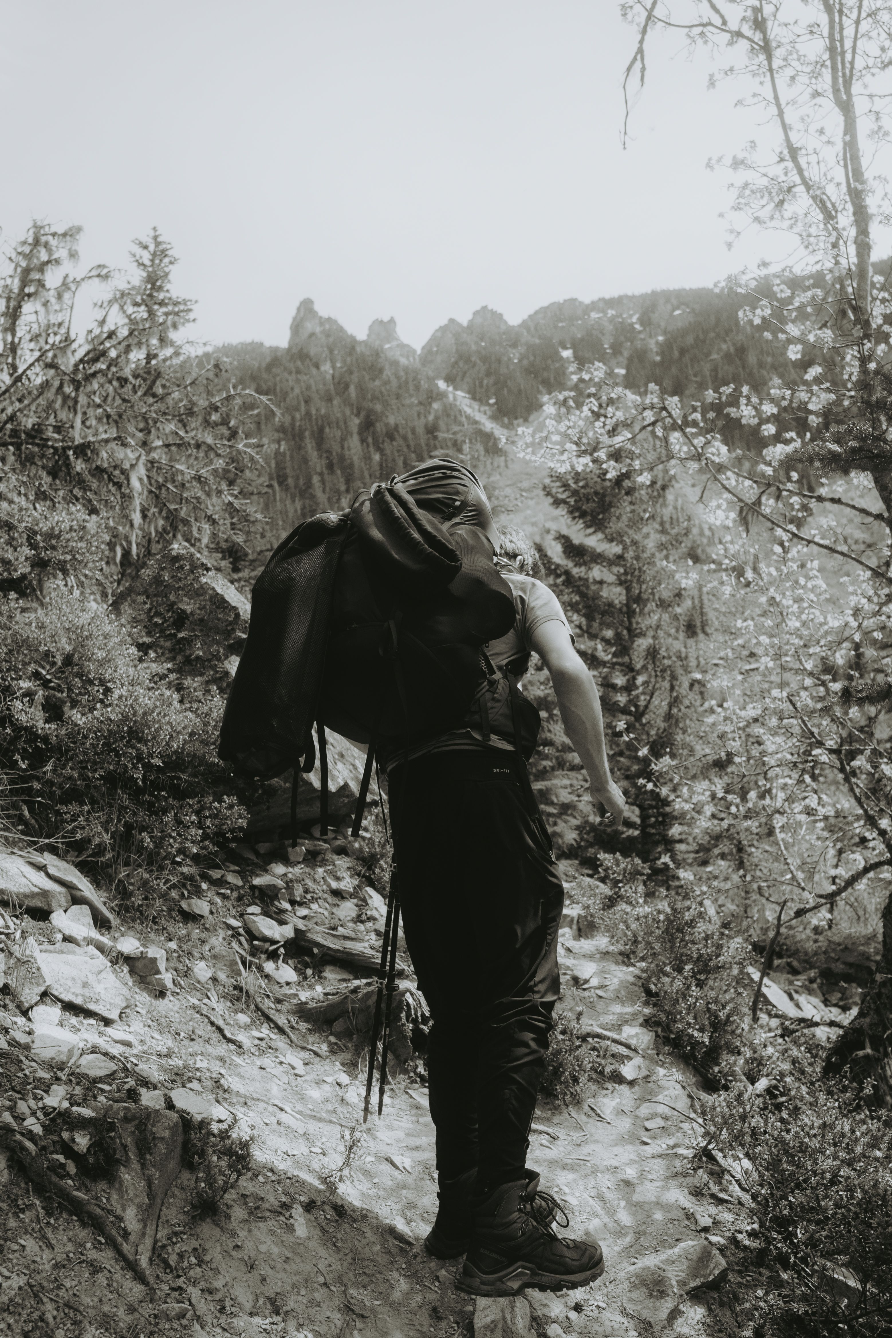 Adventurous Hiker Exploring Mountain Trail · Free Stock Photo