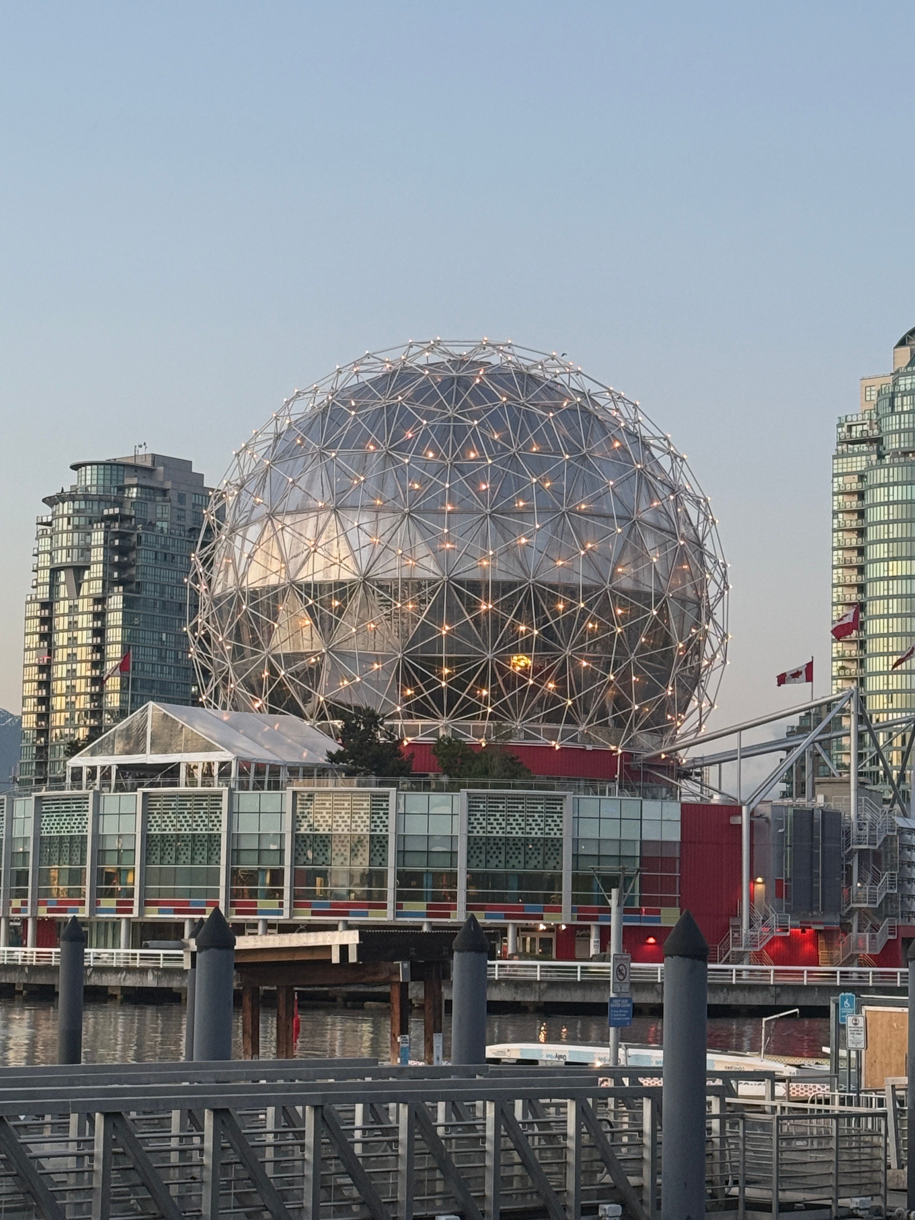 Amazon Spheres Beside a High Rise Building · Free Stock Photo