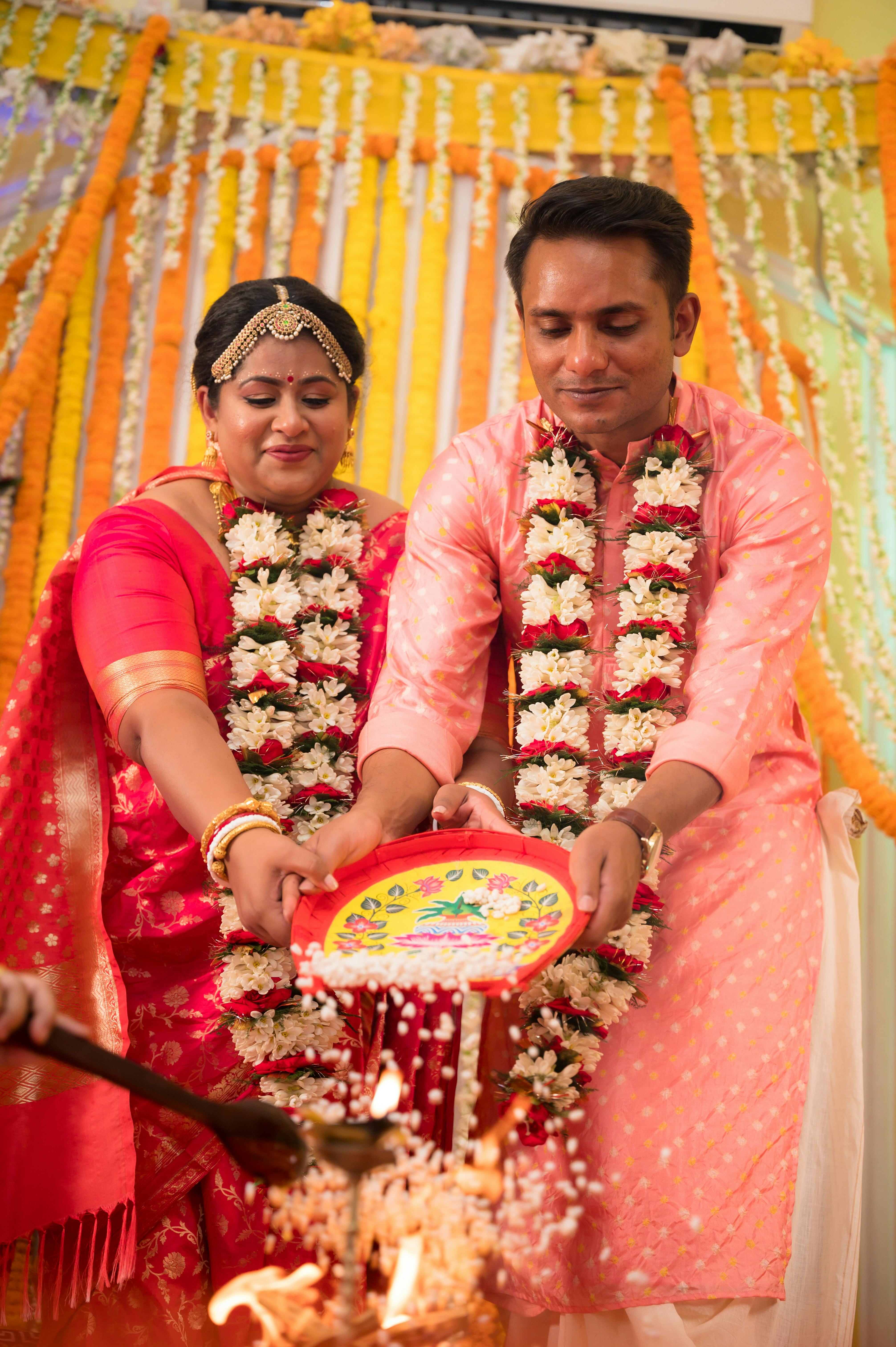Vibrant Indian Wedding Ritual with Traditional Attire · Free Stock Photo