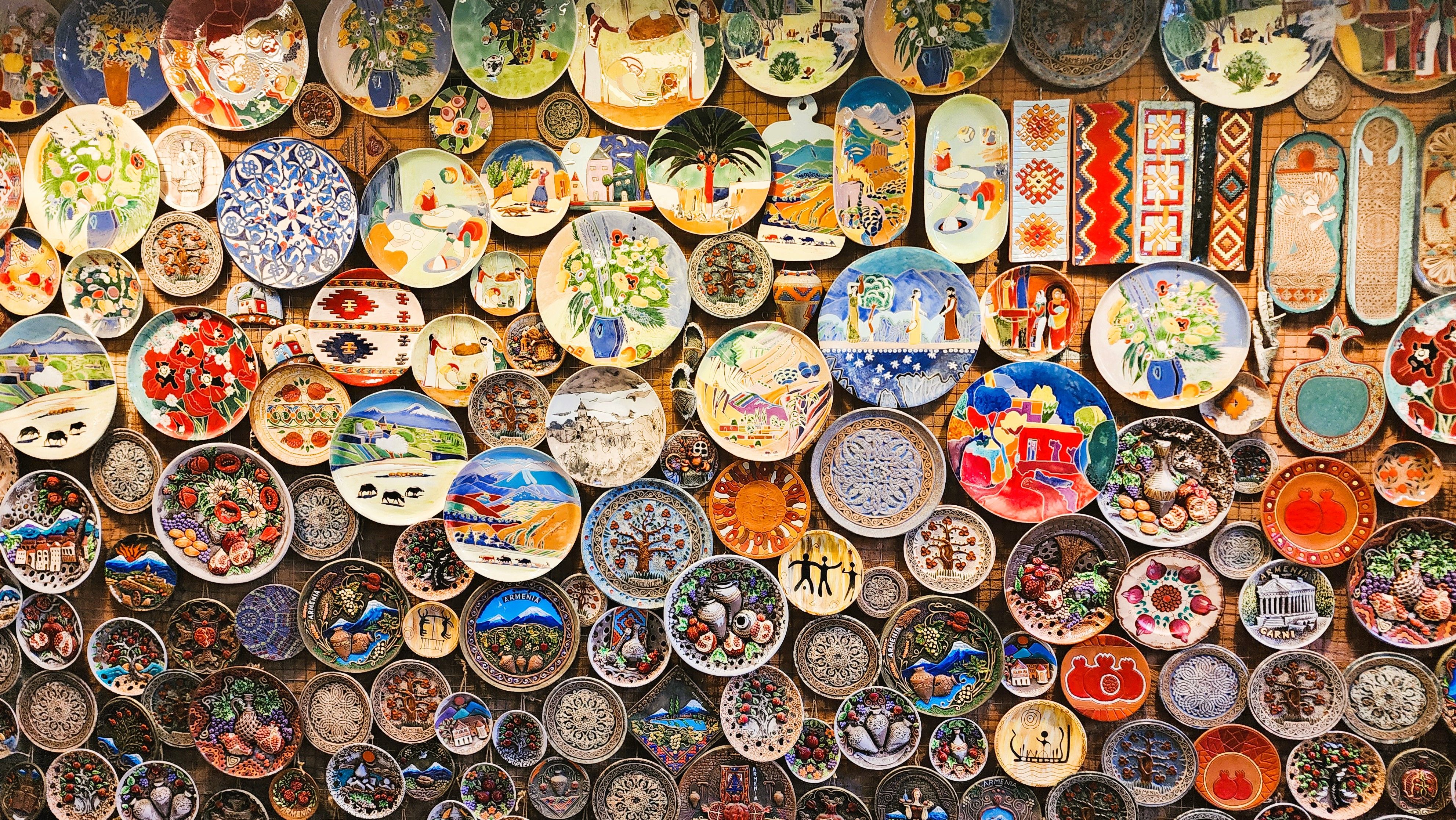 Colorful Armenian Ceramic Plate Art Display in Yerevan · Free Stock Photo