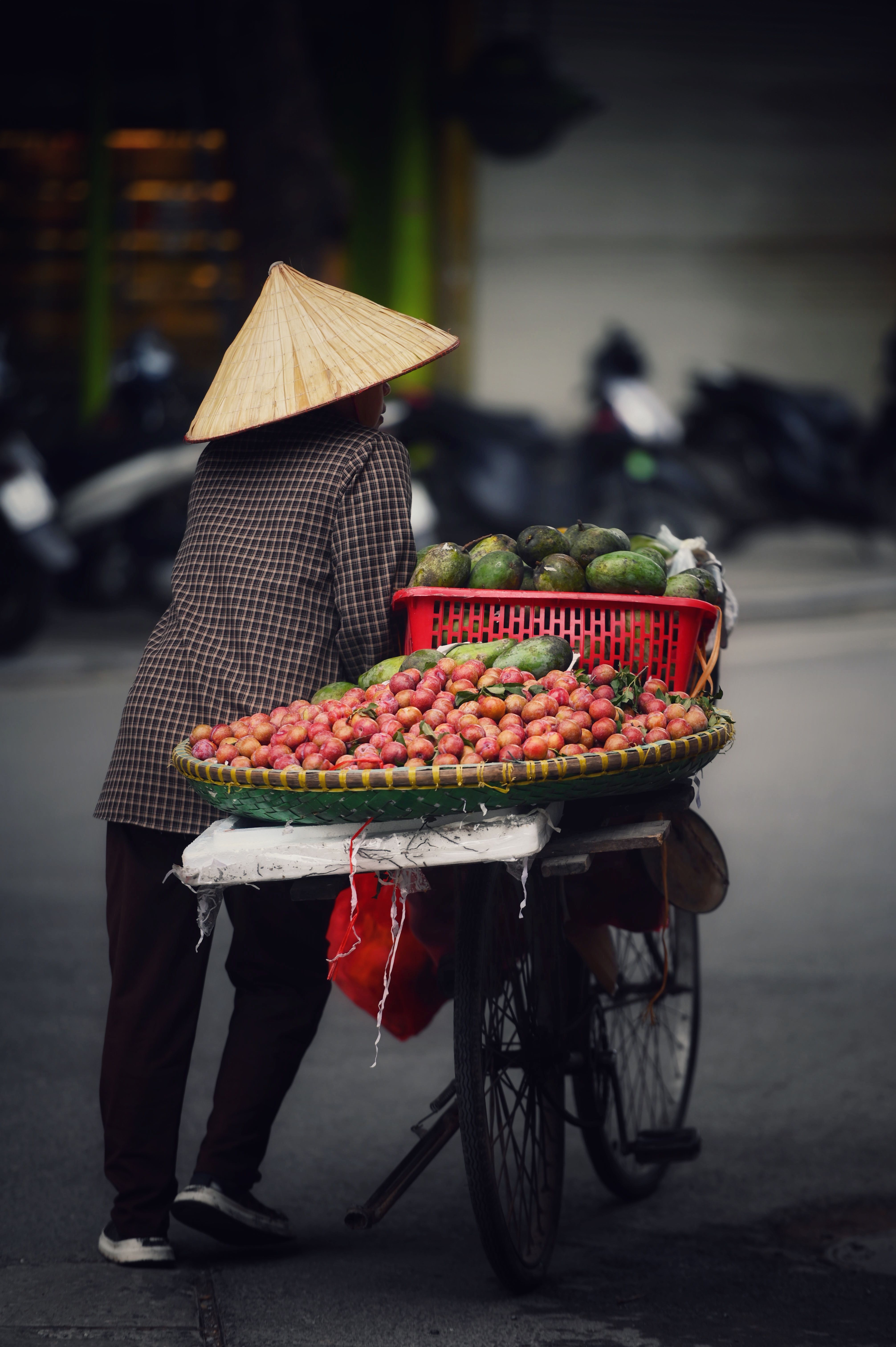 Street Vendor with Bicycle Selling Fresh Produce · Free Stock Photo