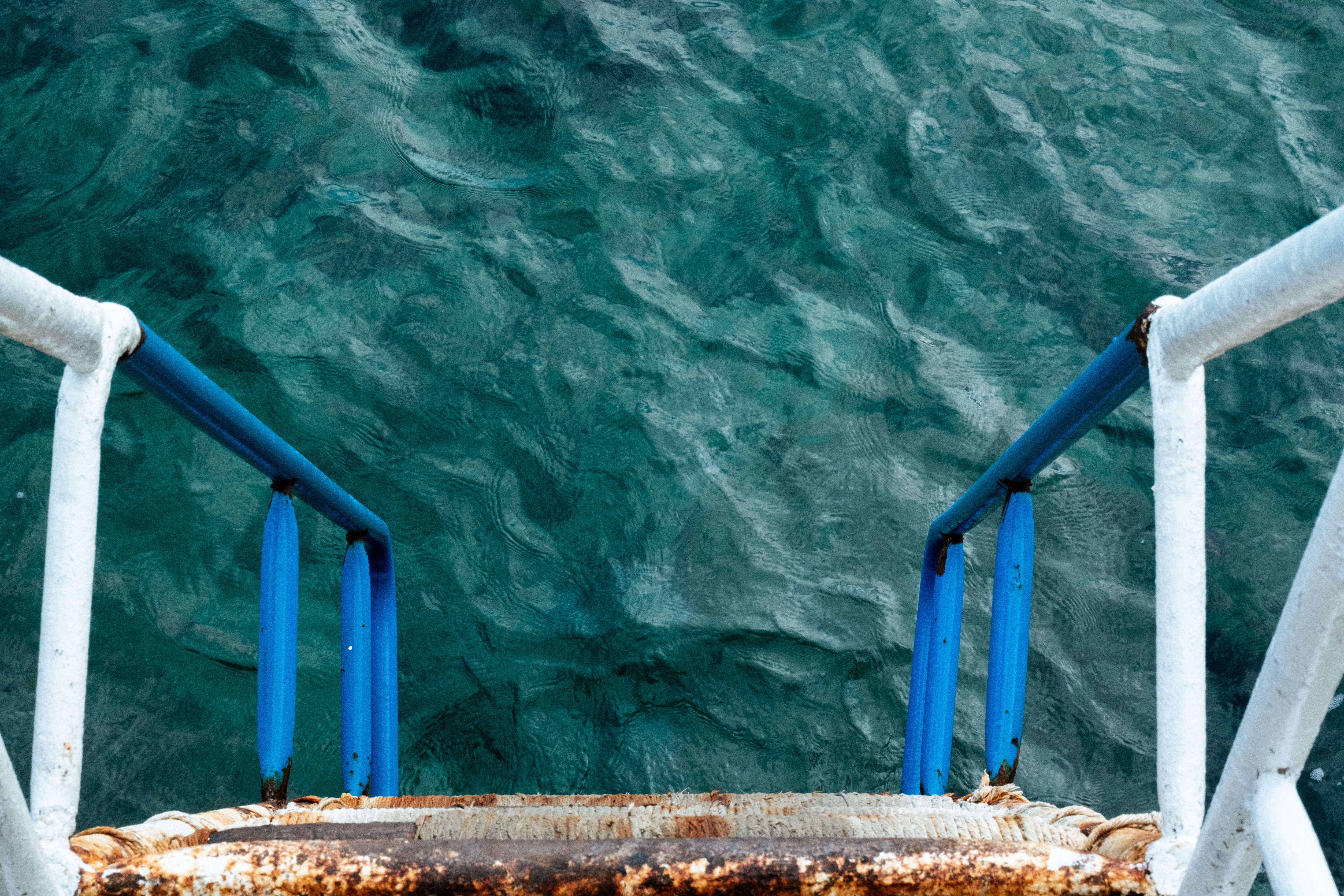 Rusty Metal Steps Leading into Clear Sea Water · Free Stock Photo