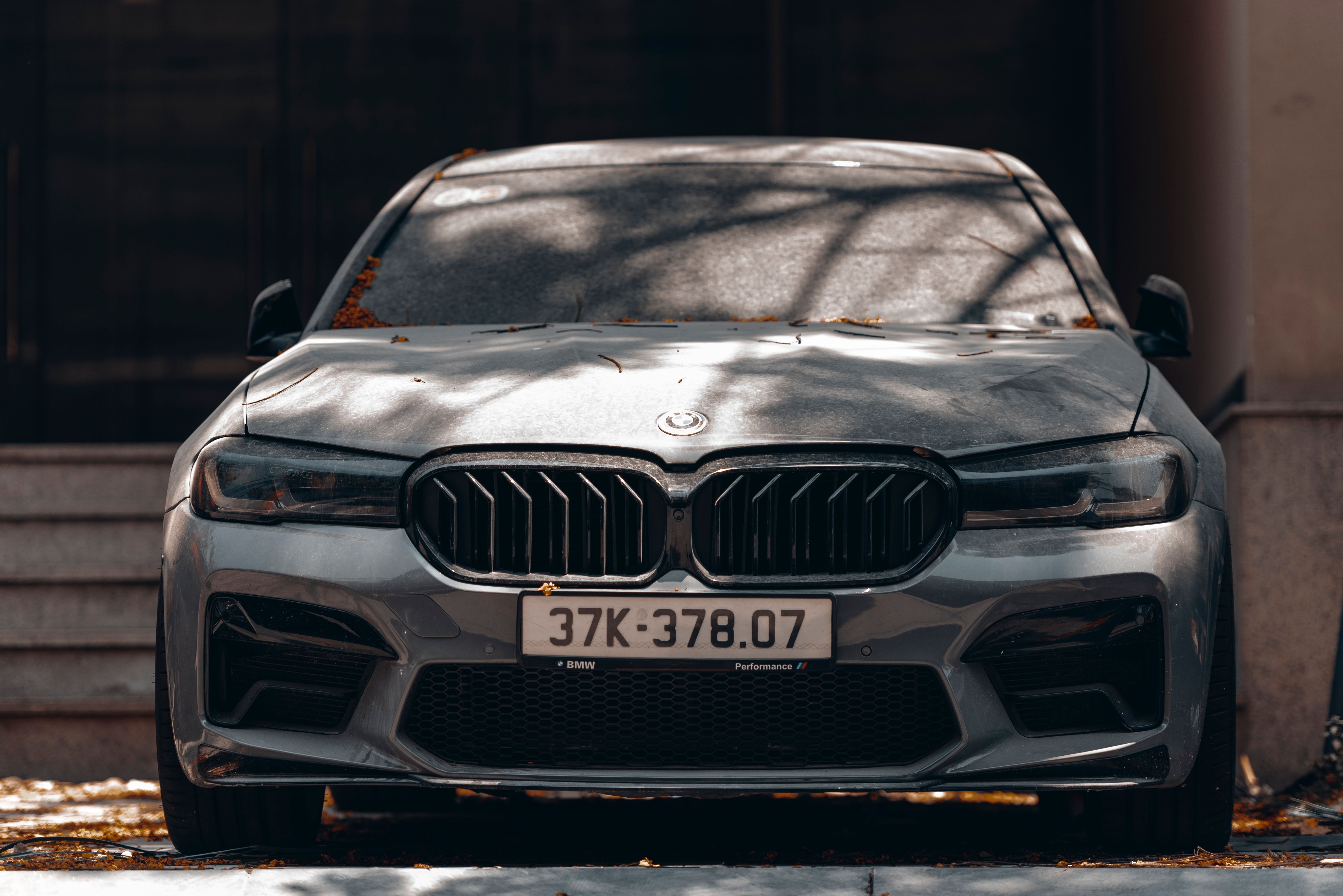 Dusty Car Parked in Urban Environment · Free Stock Photo