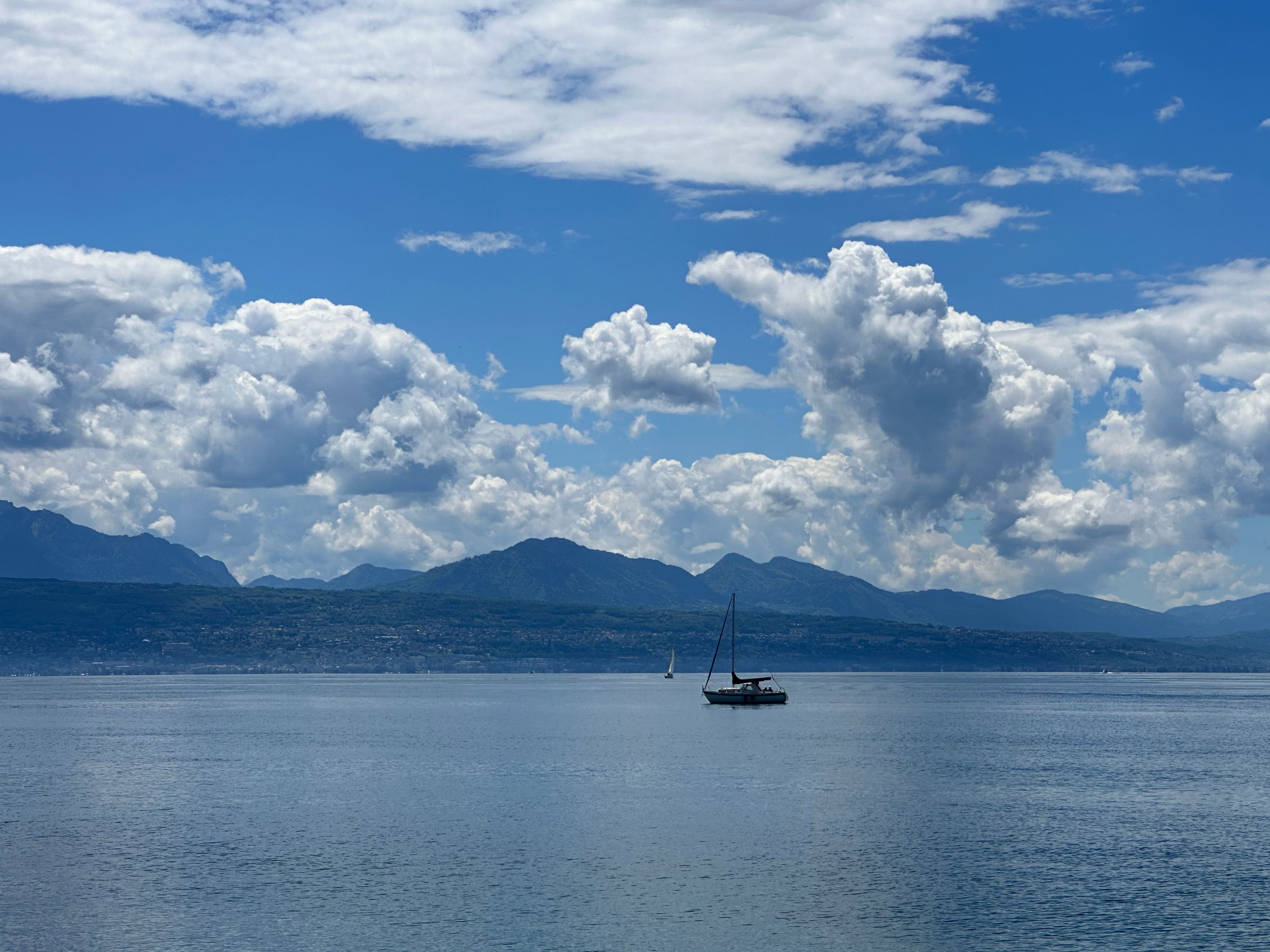 Scenic View of Lake Geneva with Sailing Boats · Free Stock Photo