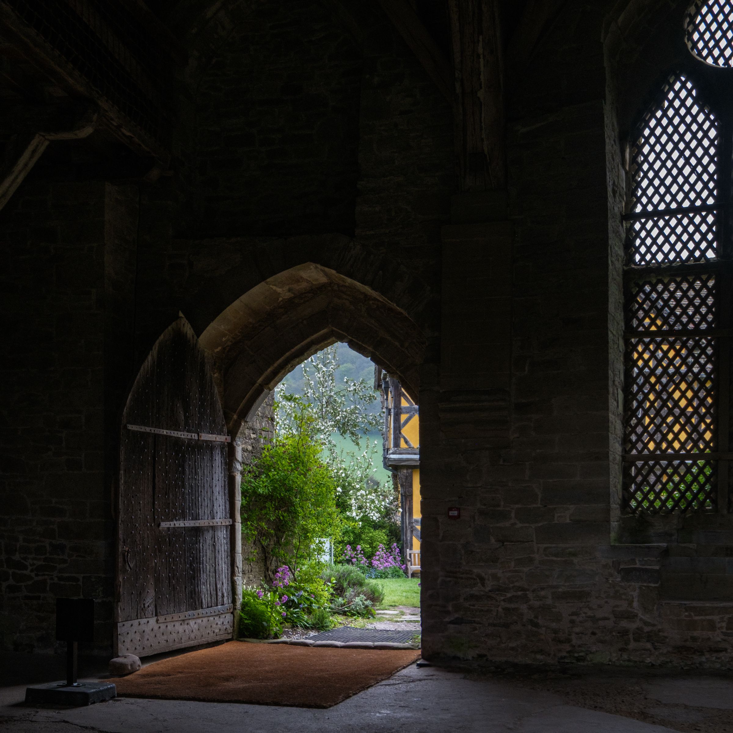 Historic English Castle Archway with Garden View · Free Stock Photo