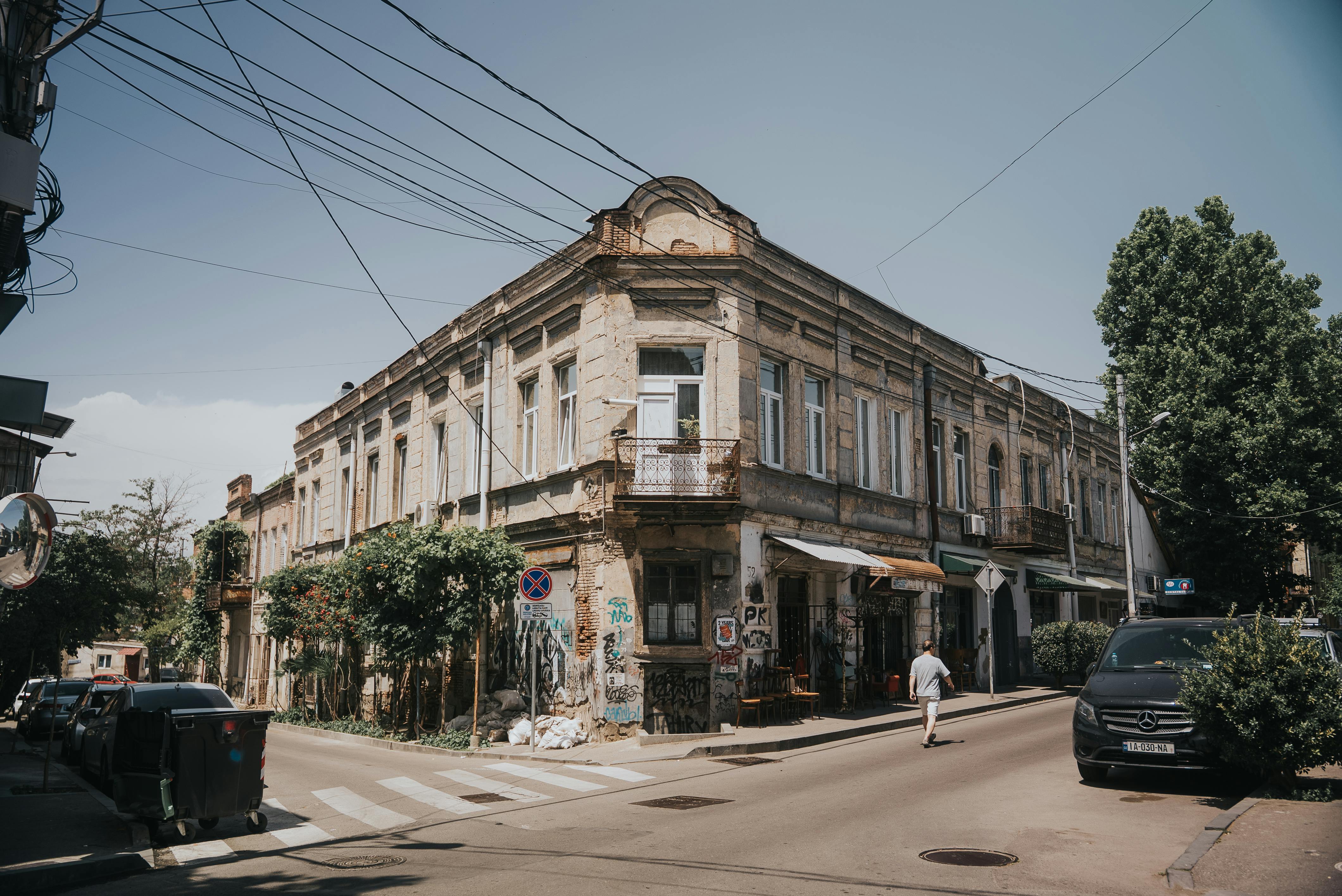 Historic Architecture on a Street Corner in Tbilisi · Free Stock Photo