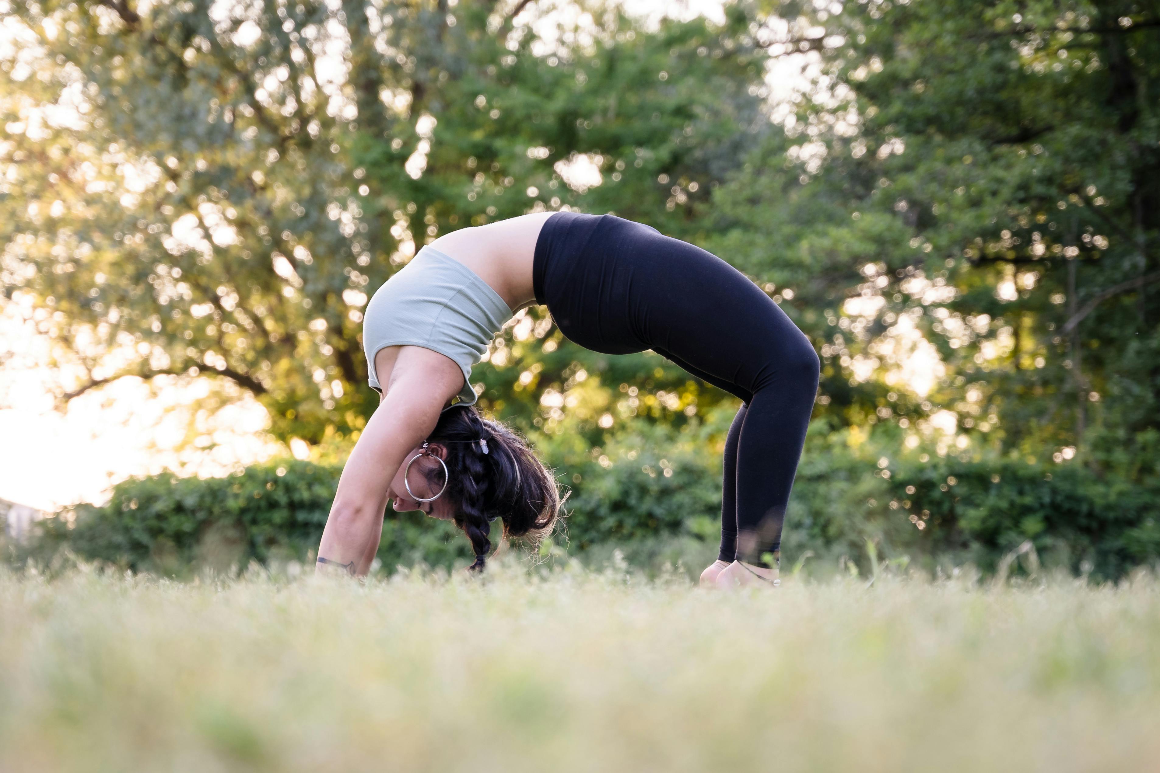 Flexible Woman Practicing Outdoor Yoga Backbend · Free Stock Photo