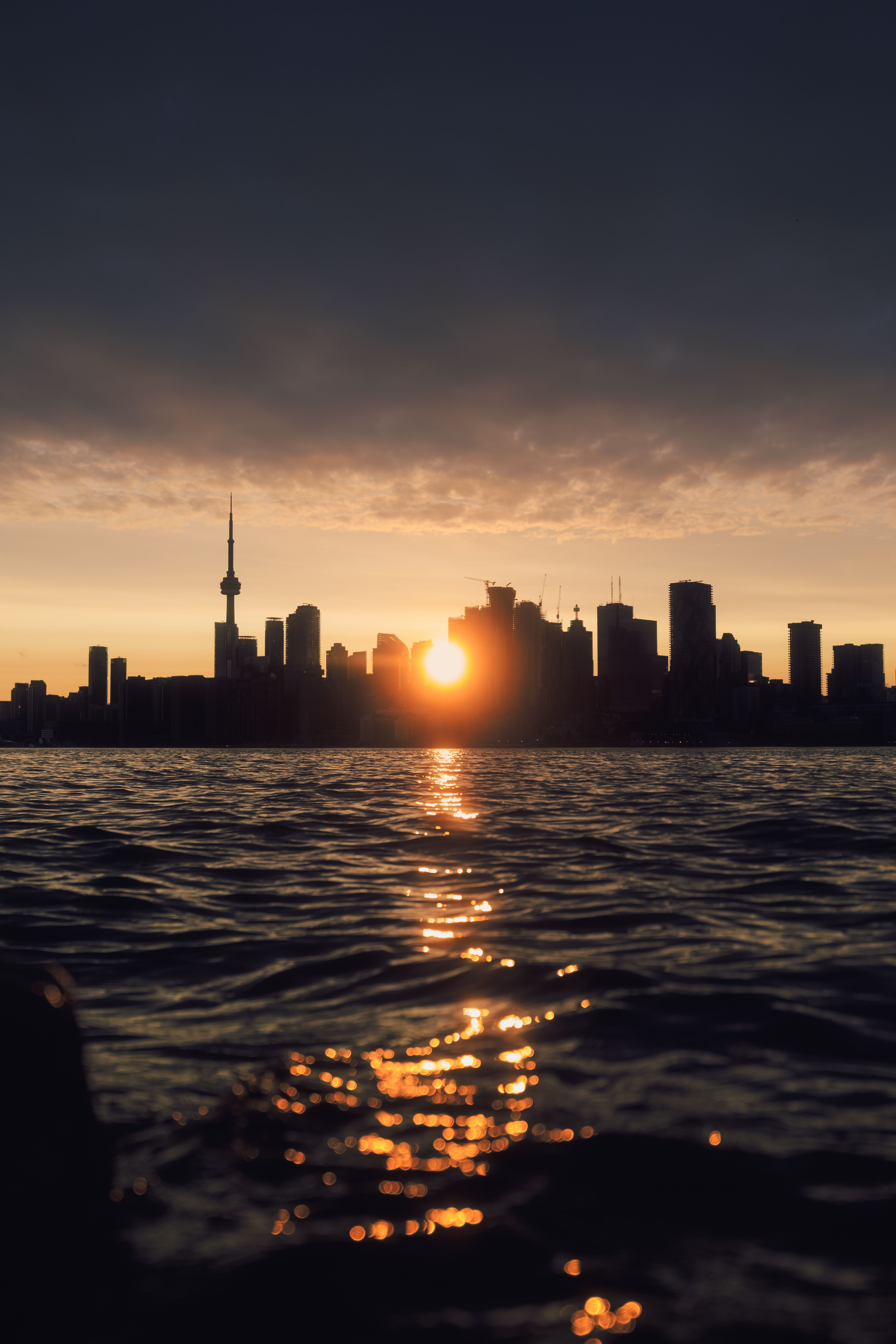 Toronto Skyline at Sunset Over Lake Ontario · Free Stock Photo