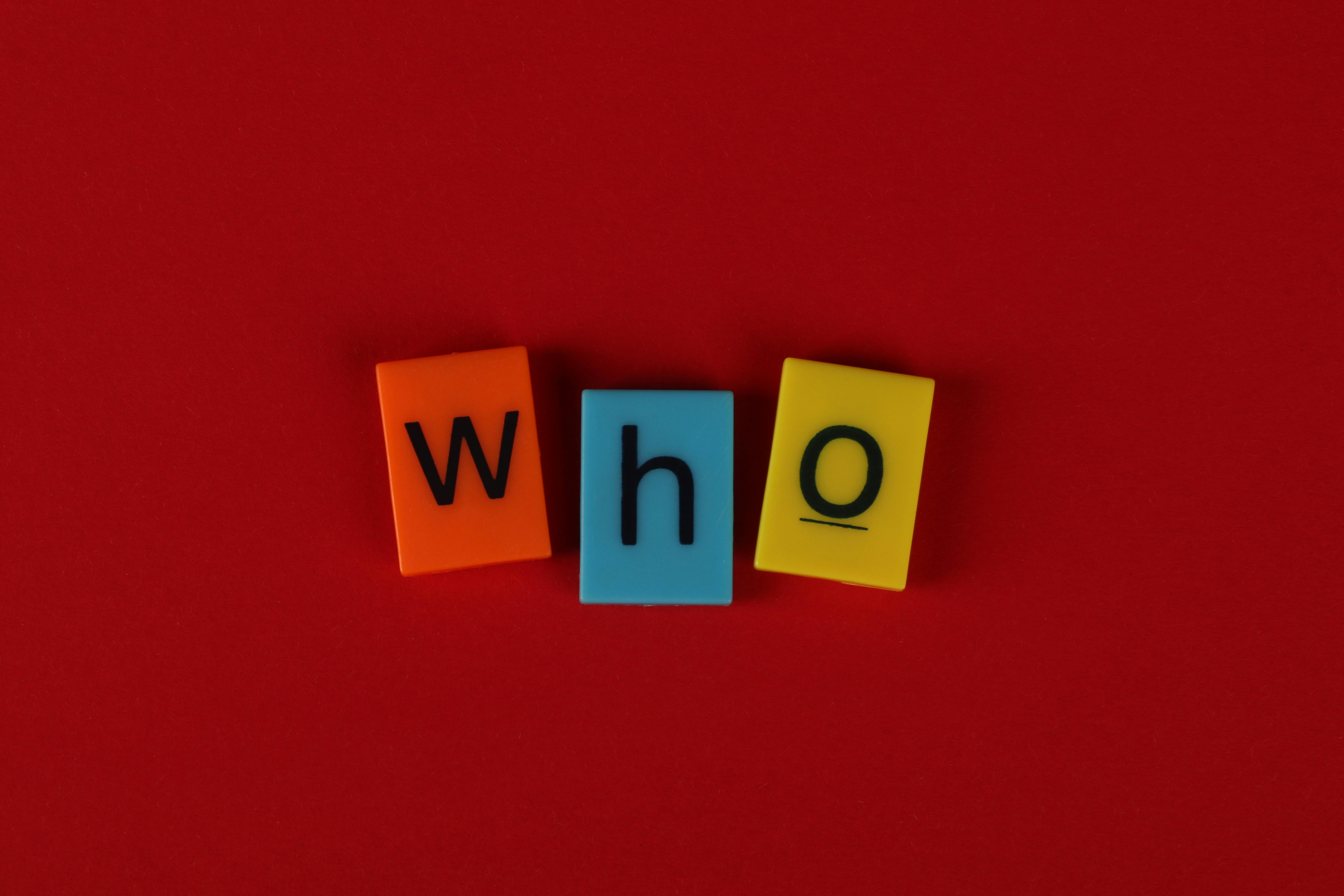 Colorful Alphabet Block Spelling 'Who' on Red Background · Free Stock Photo