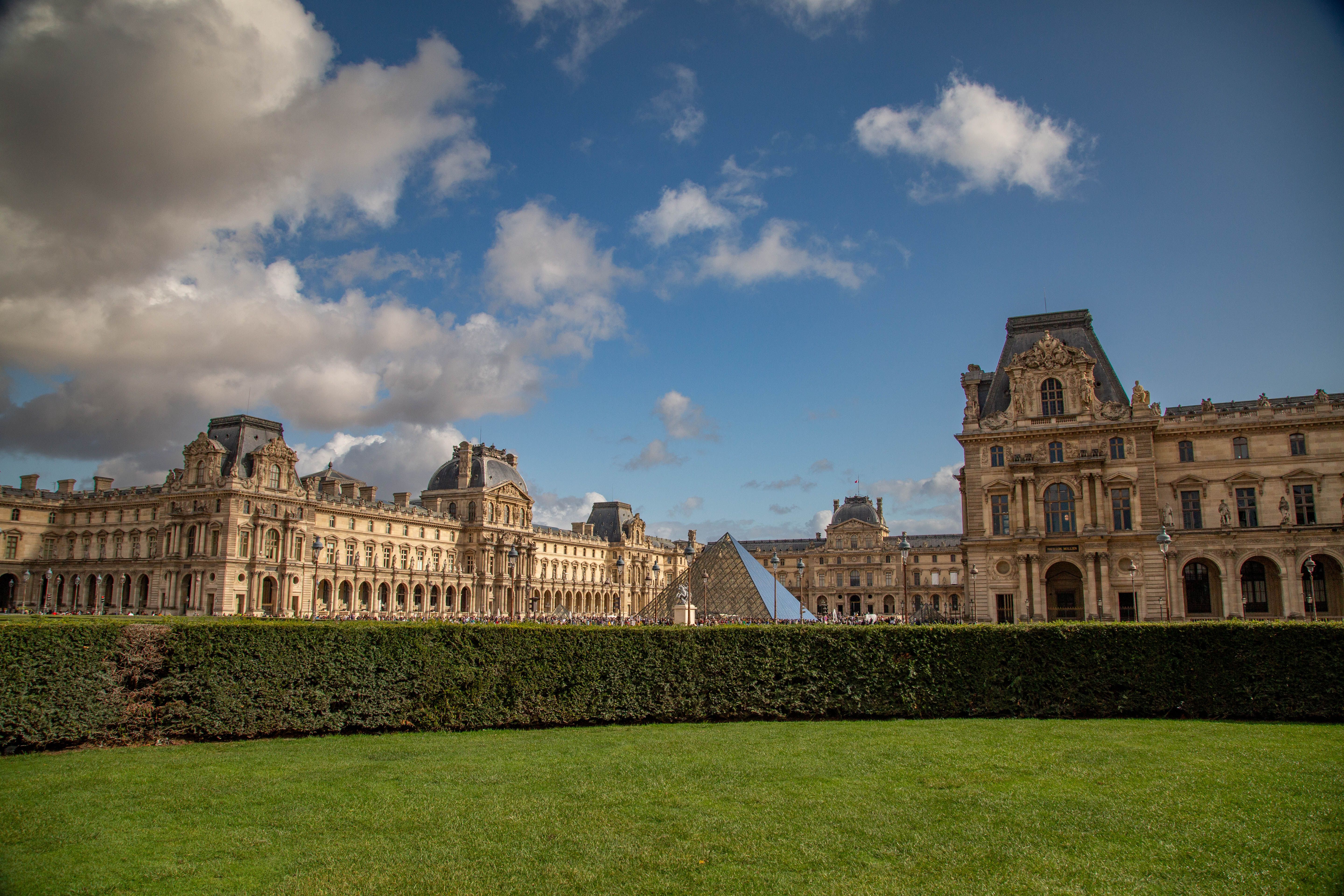 Louvre Museum and Pyramid on a Clear Day · Free Stock Photo