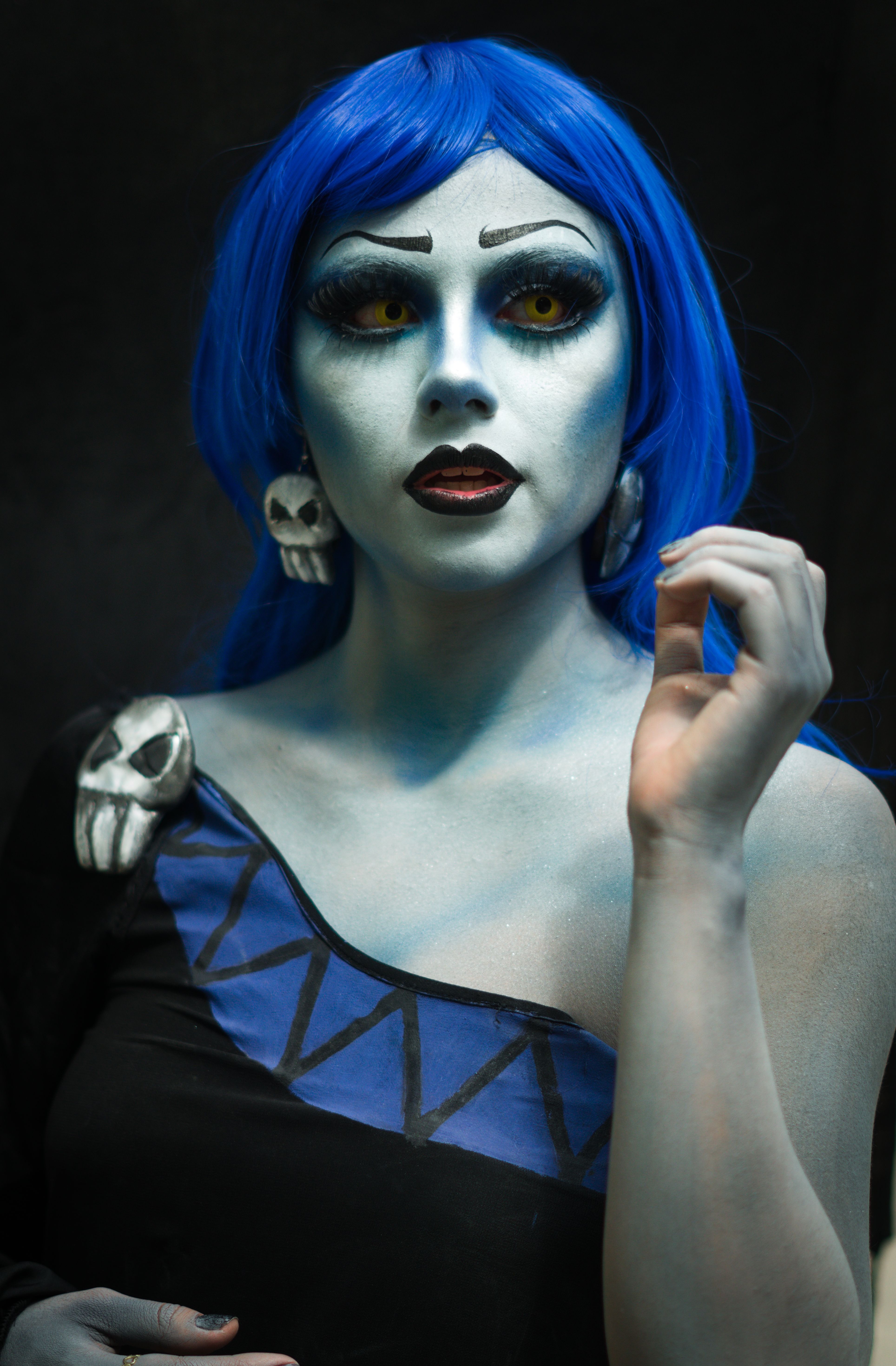 Vibrant Blue-Haired Cosplay Portrait with Skull Accents · Free Stock Photo