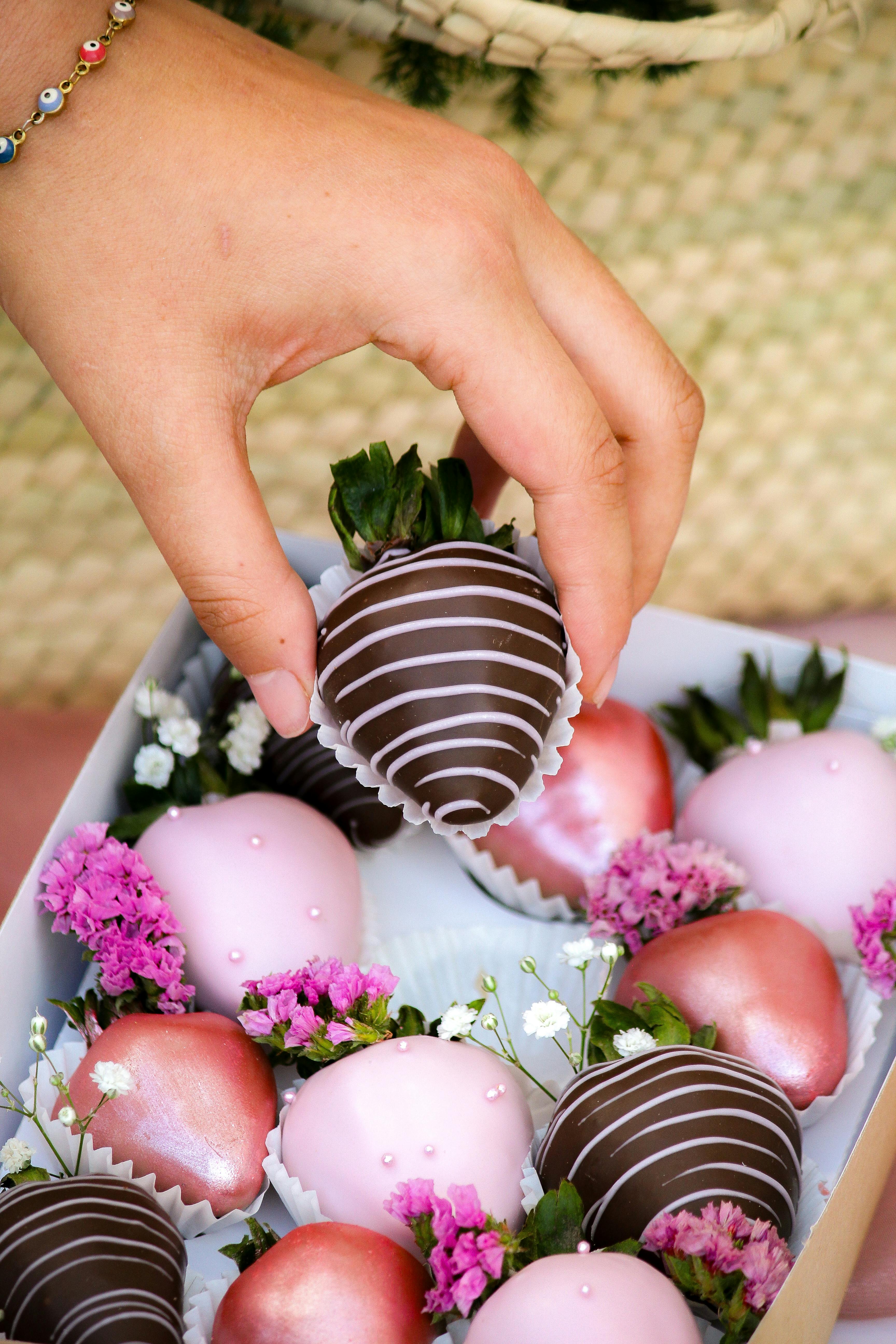 Gourmet Chocolate Covered Strawberries with Floral Decor · Free Stock Photo