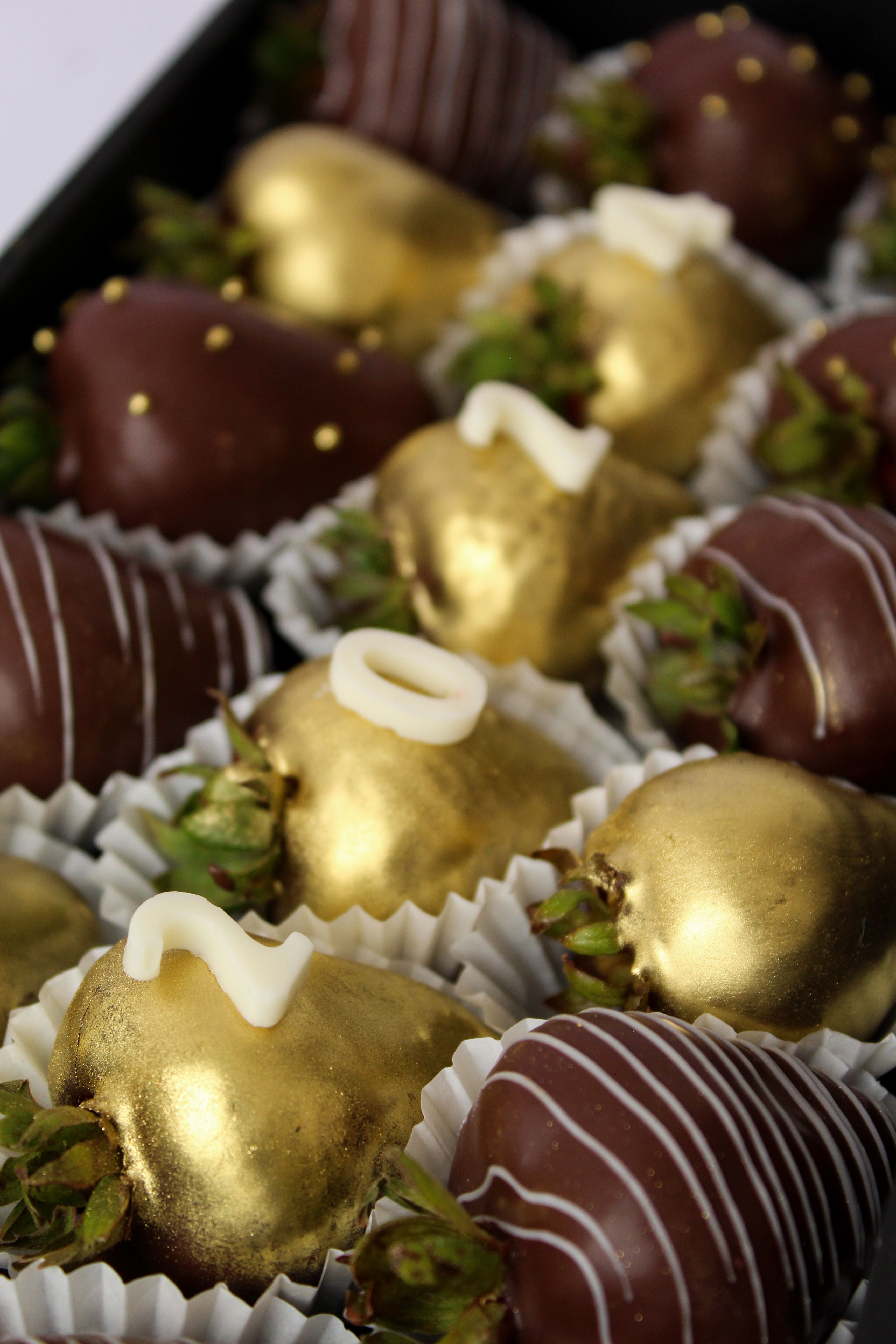 Luxurious Gold and Chocolate Covered Strawberries · Free Stock Photo