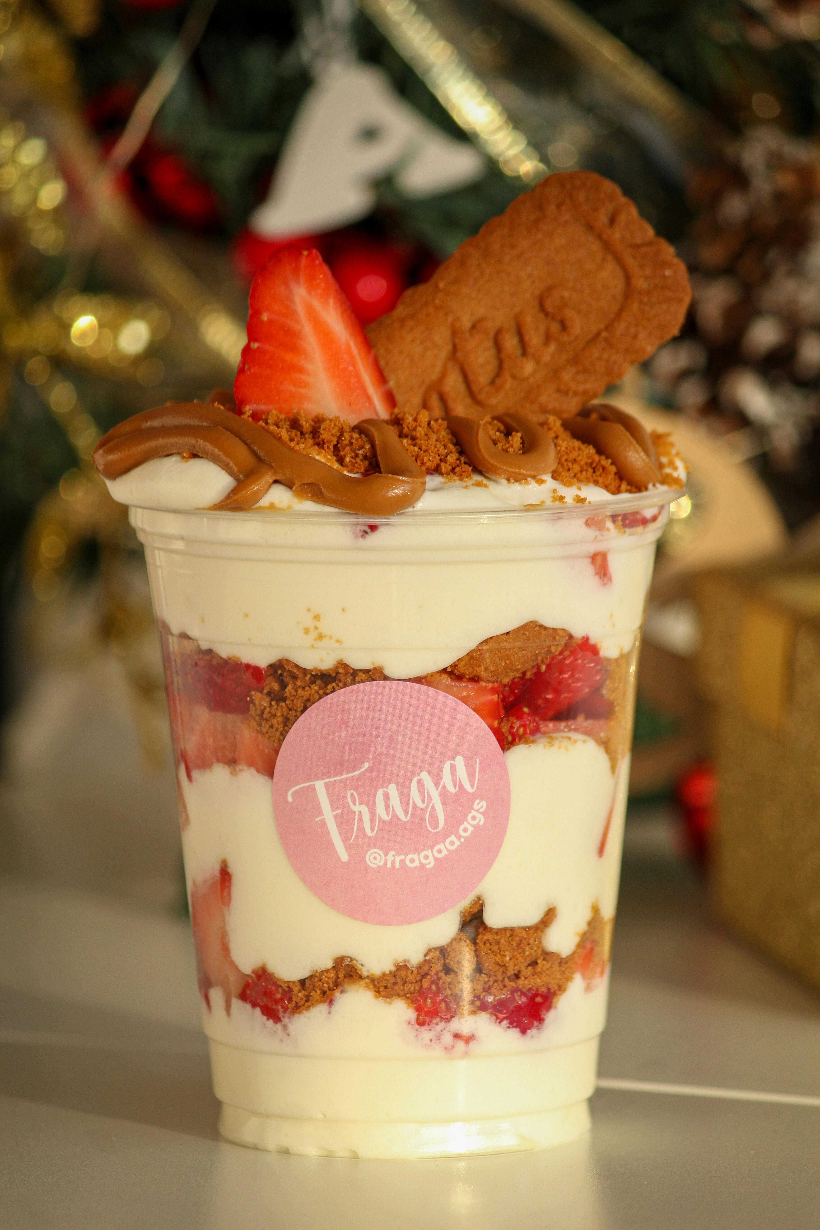 Delicious Strawberry Dessert with Cookie Topping · Free Stock Photo