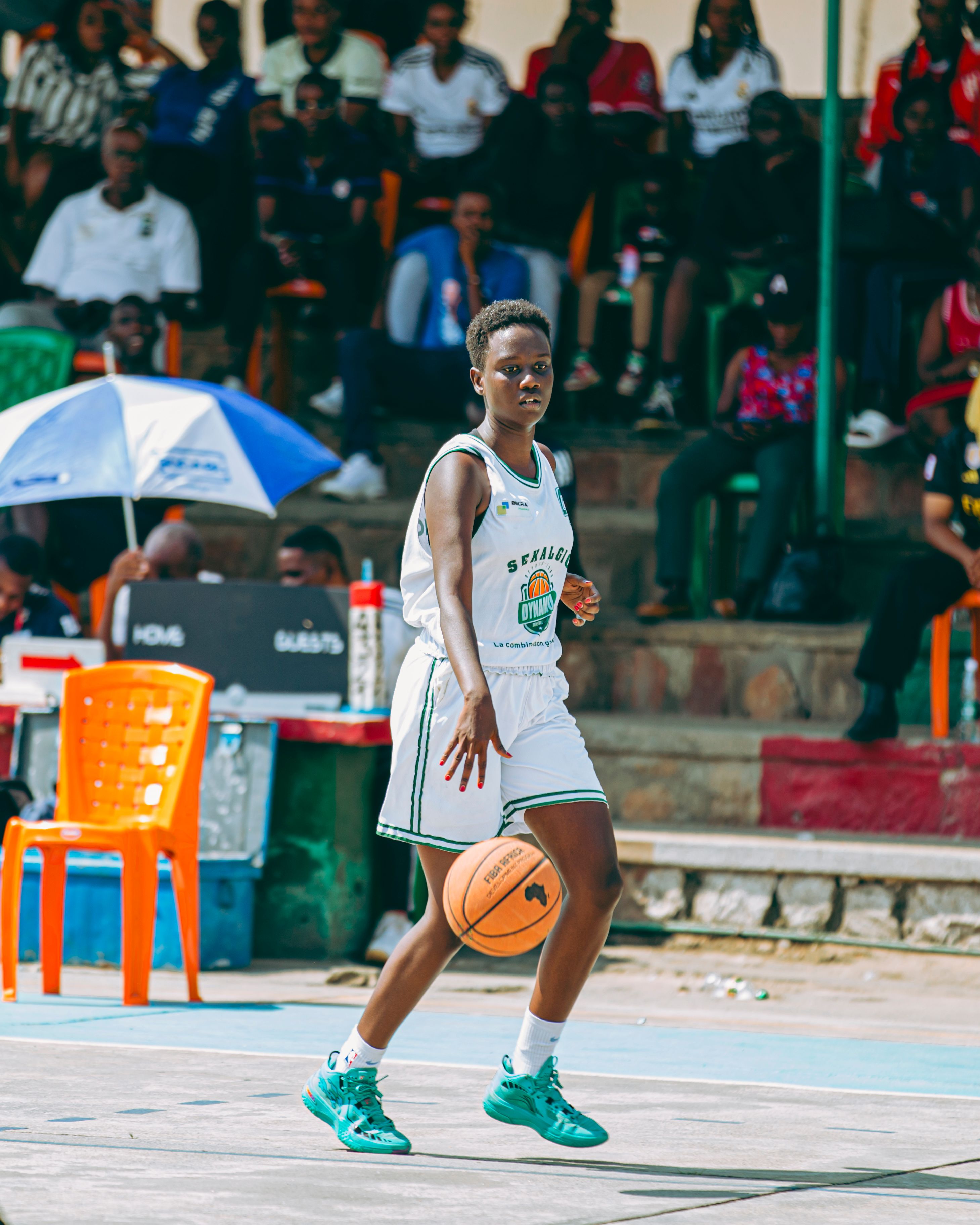 Intense Street Basketball Game with Player in Action · Free Stock Photo