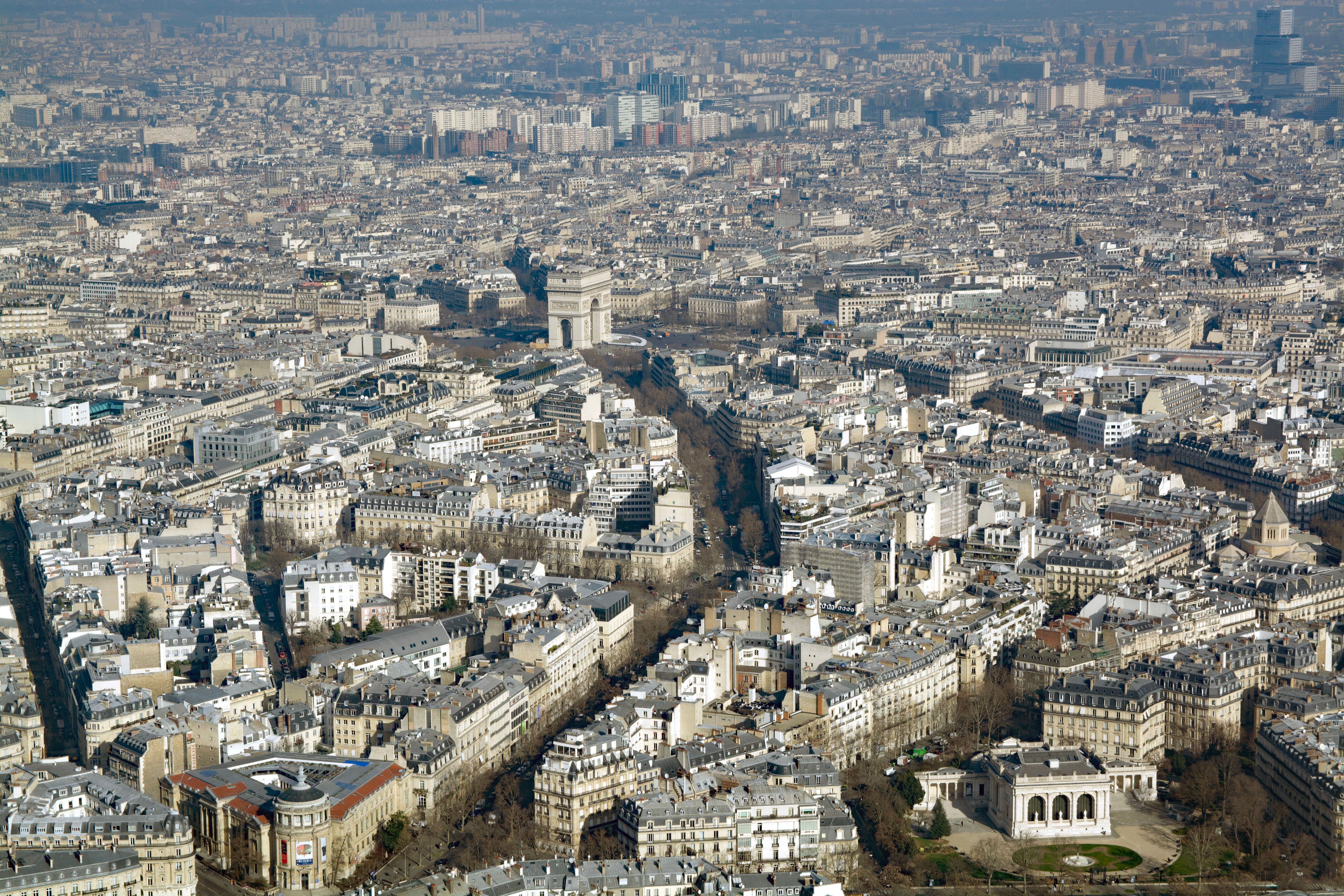 Aerial View of Paris Featuring Arc de Triomphe · Free Stock Photo