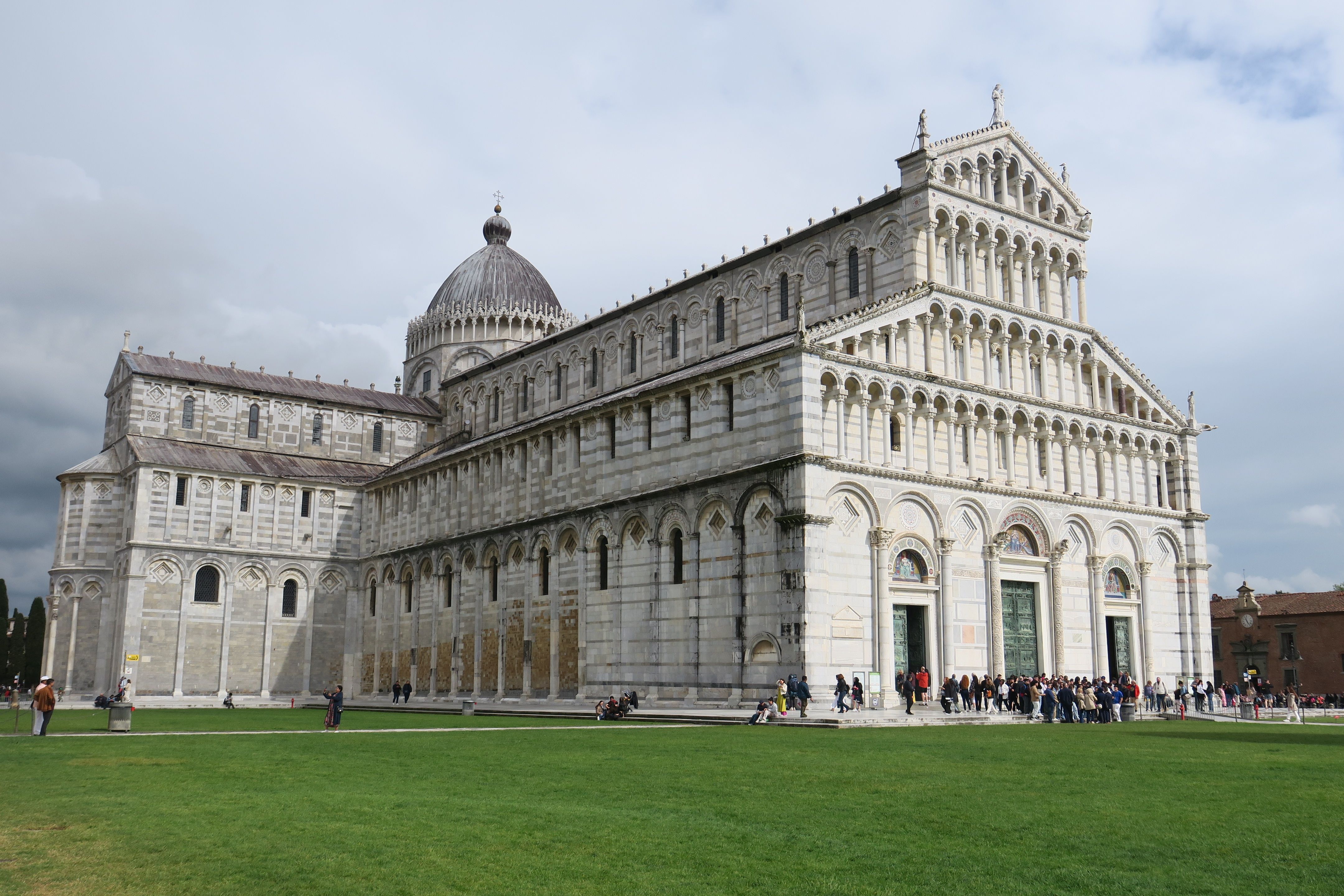 Stunning View of Pisa Cathedral on a Cloudy Day · Free Stock Photo