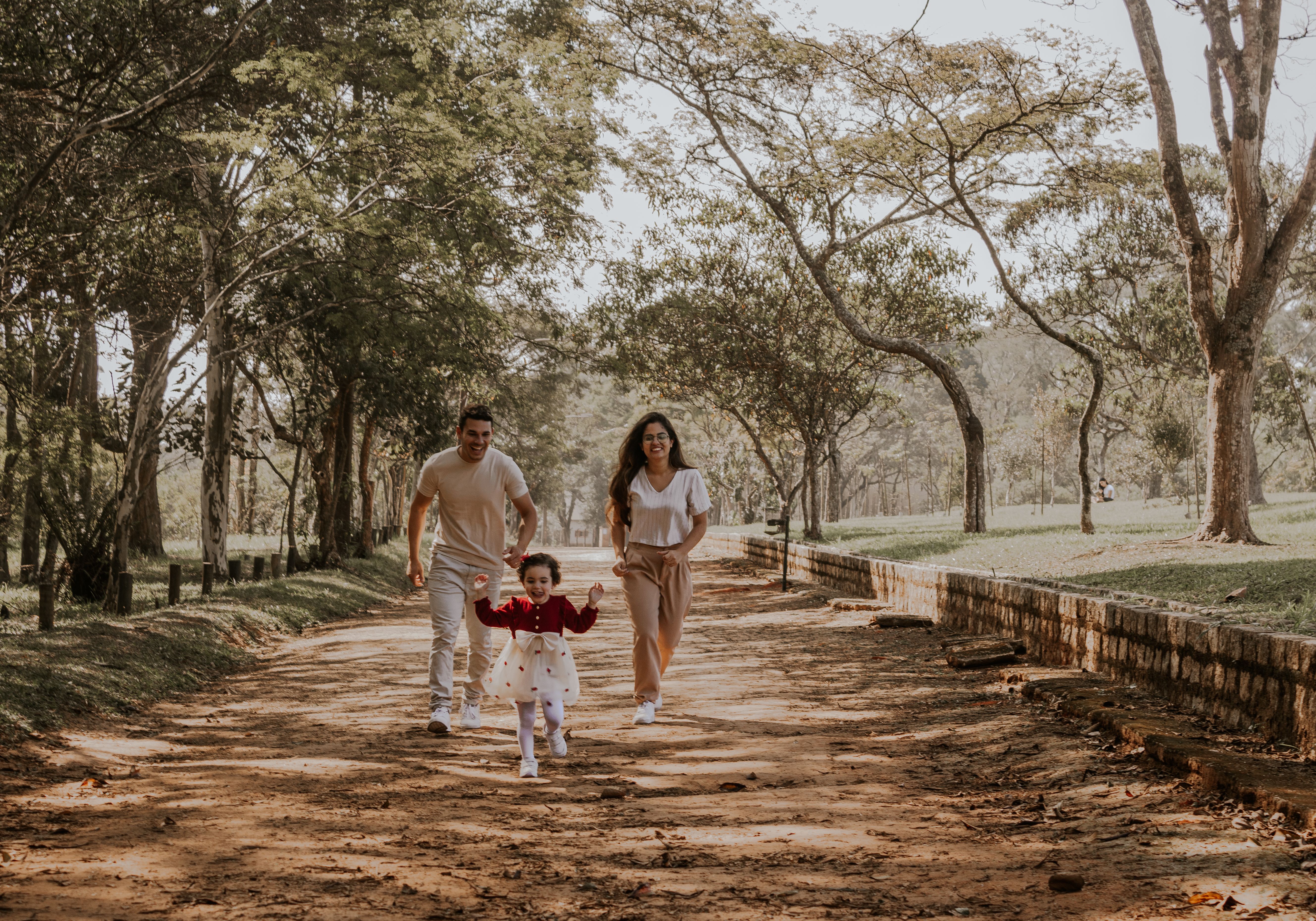 Family Enjoying a Stroll in São Paulo Park · Free Stock Photo