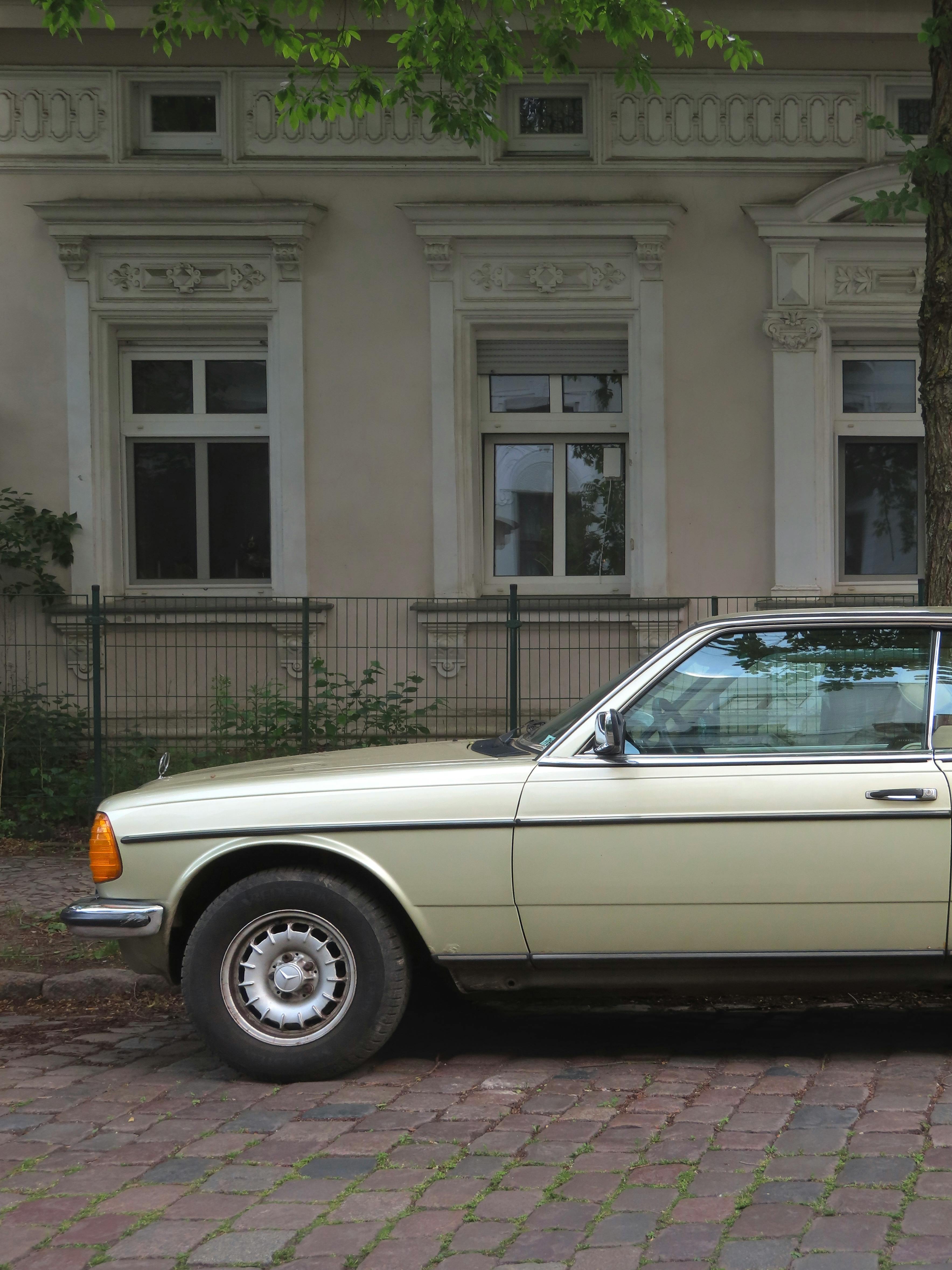 Vintage Mercedes Car Parked in Berlin Street Scene · Free Stock Photo