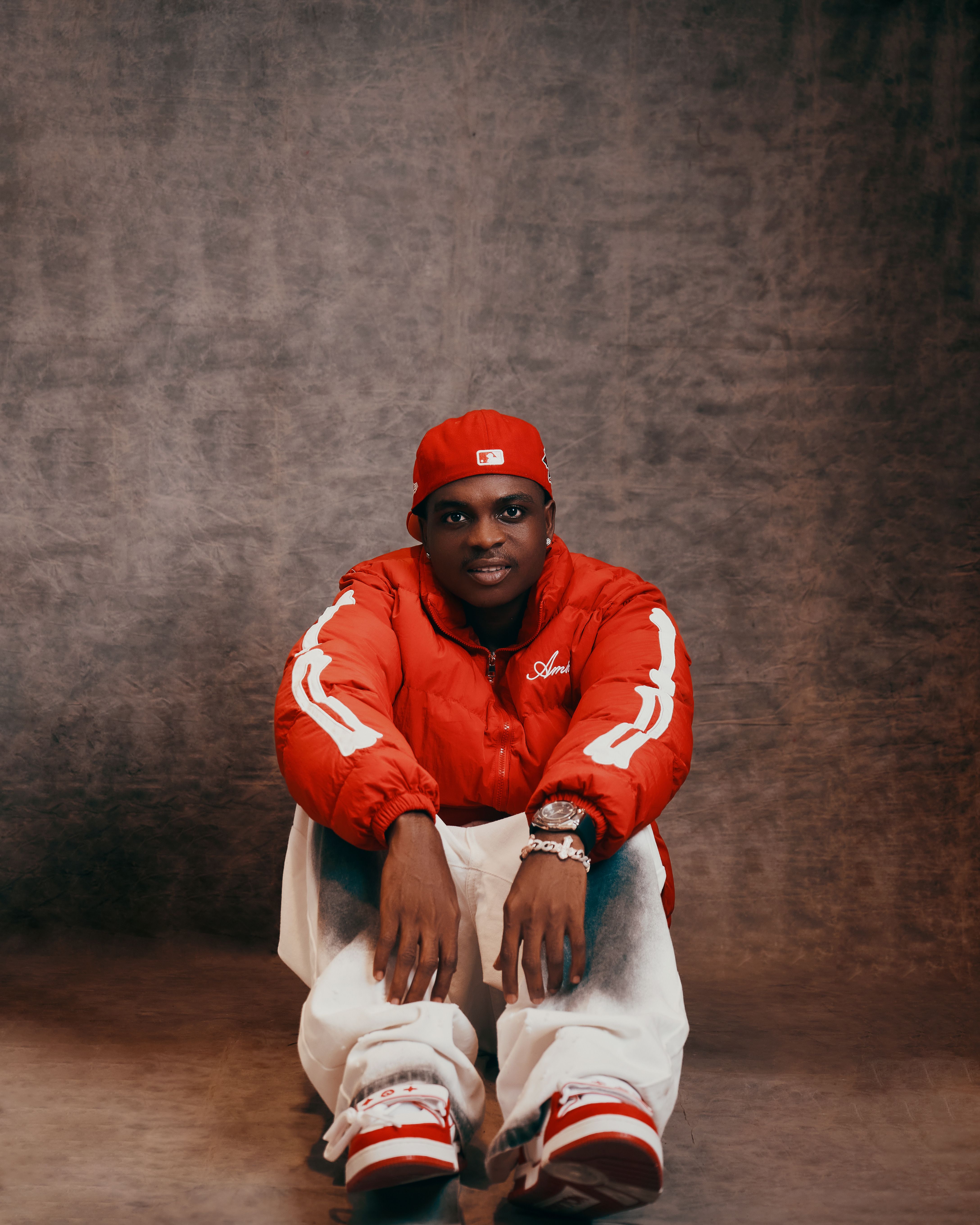 Casual Portrait of Young Man in Red Outfit · Free Stock Photo