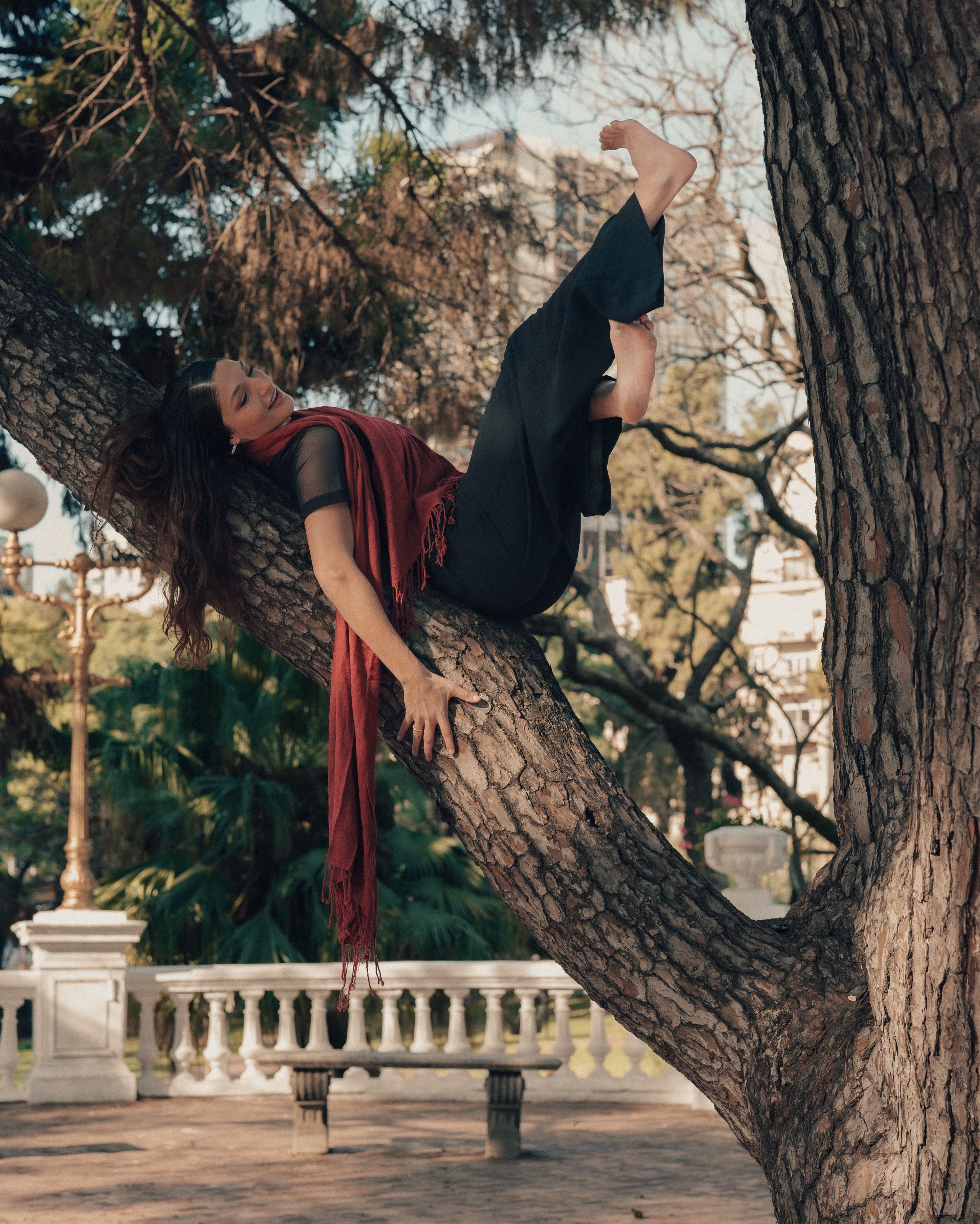 Woman Relaxing on Tree in Buenos Aires Park · Free Stock Photo