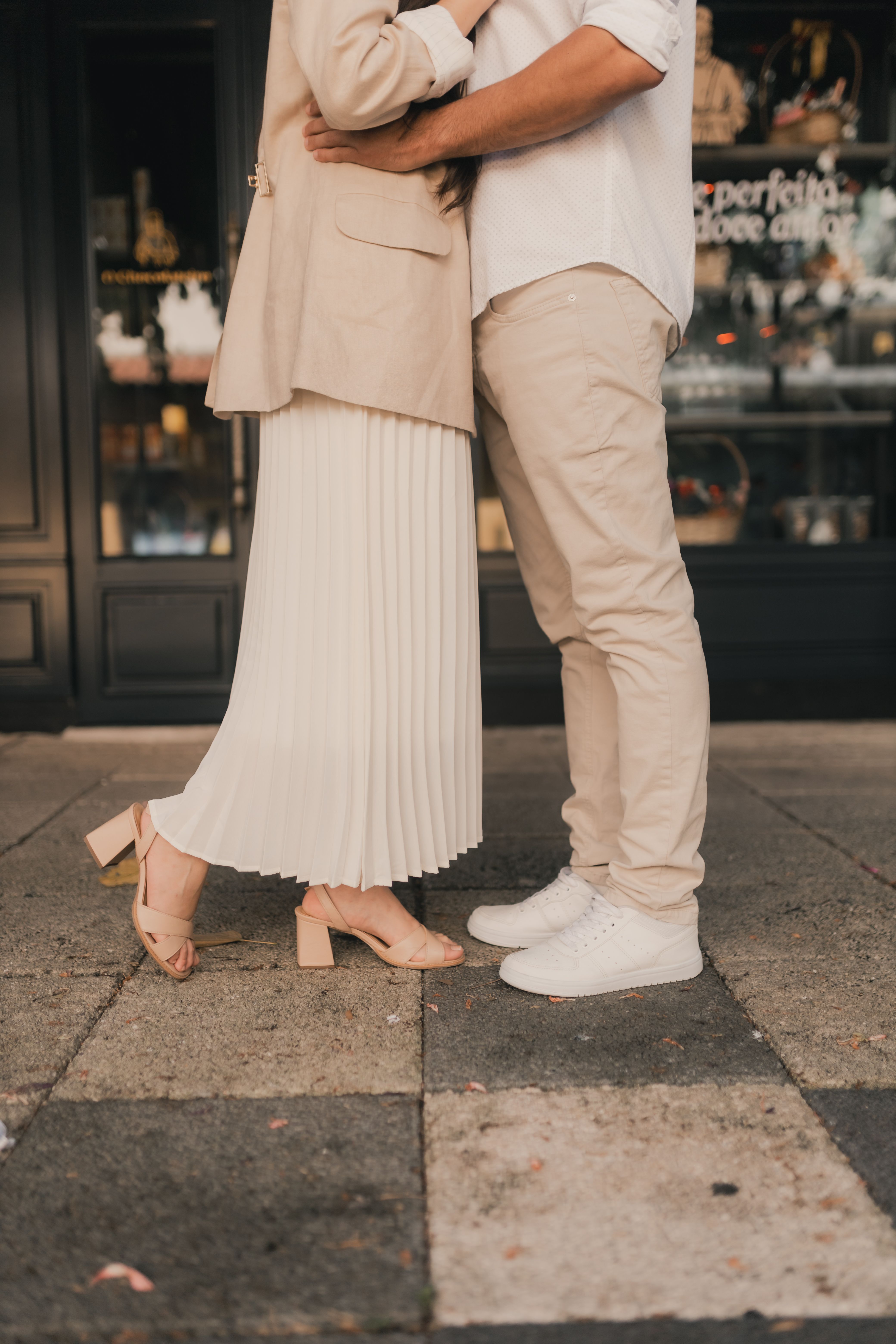 Romantic Couple Standing Close Outside Boutique · Free Stock Photo