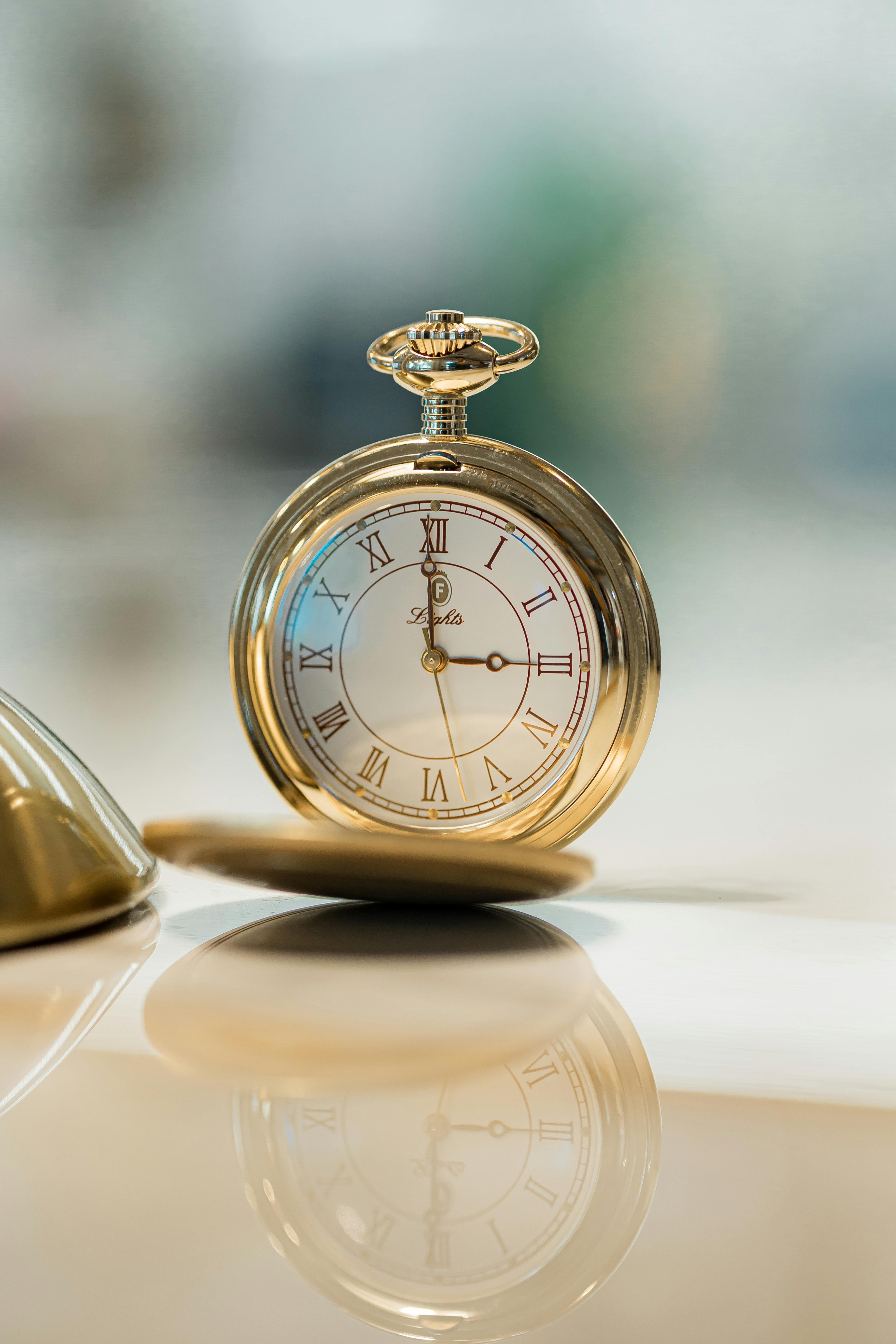 Round Gold-colored Pocket Watch · Free Stock Photo
