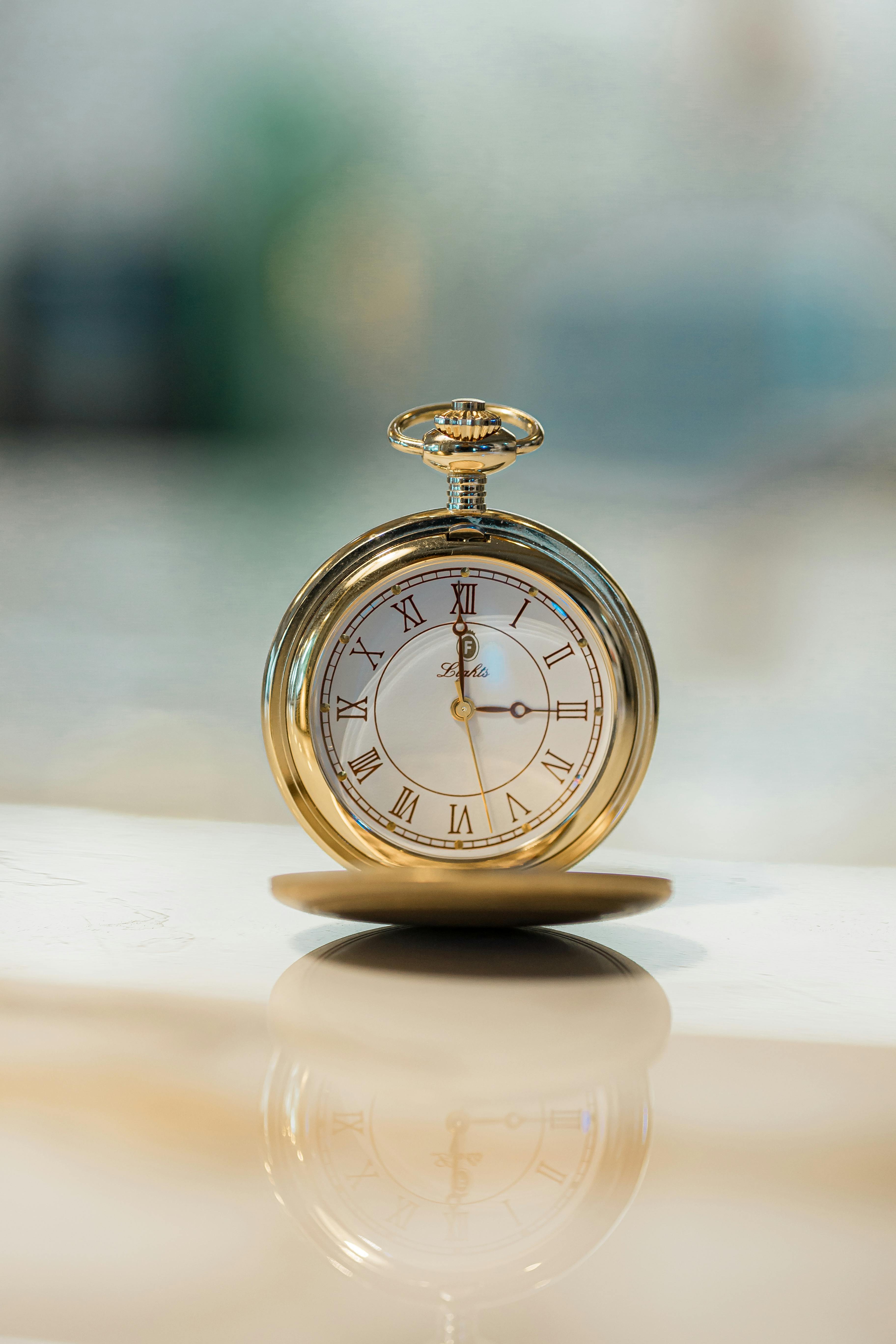 Round Gold-colored Pocket Watch · Free Stock Photo