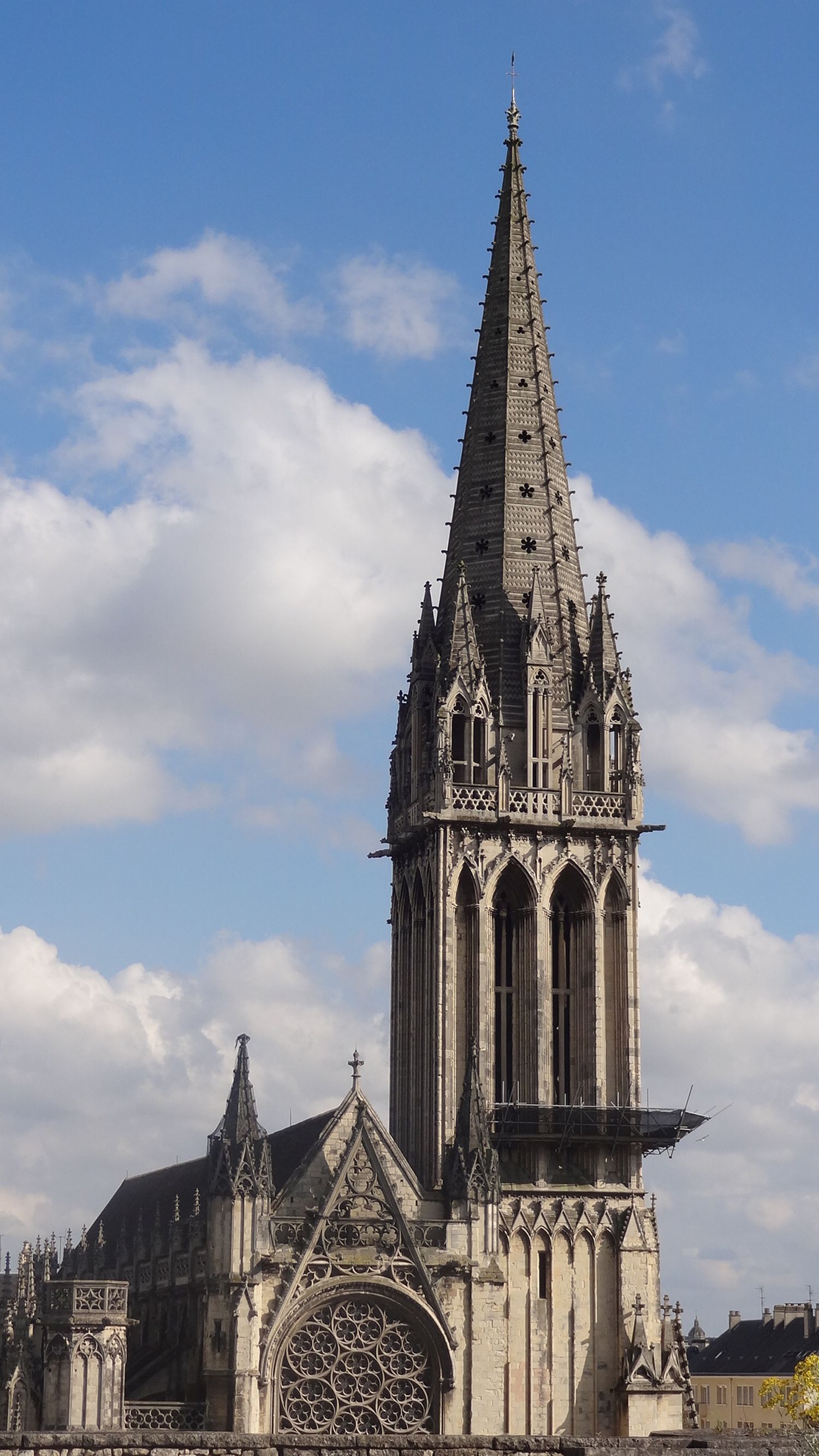 Gothic Cathedral Spire Against Blue Sky · Free Stock Photo