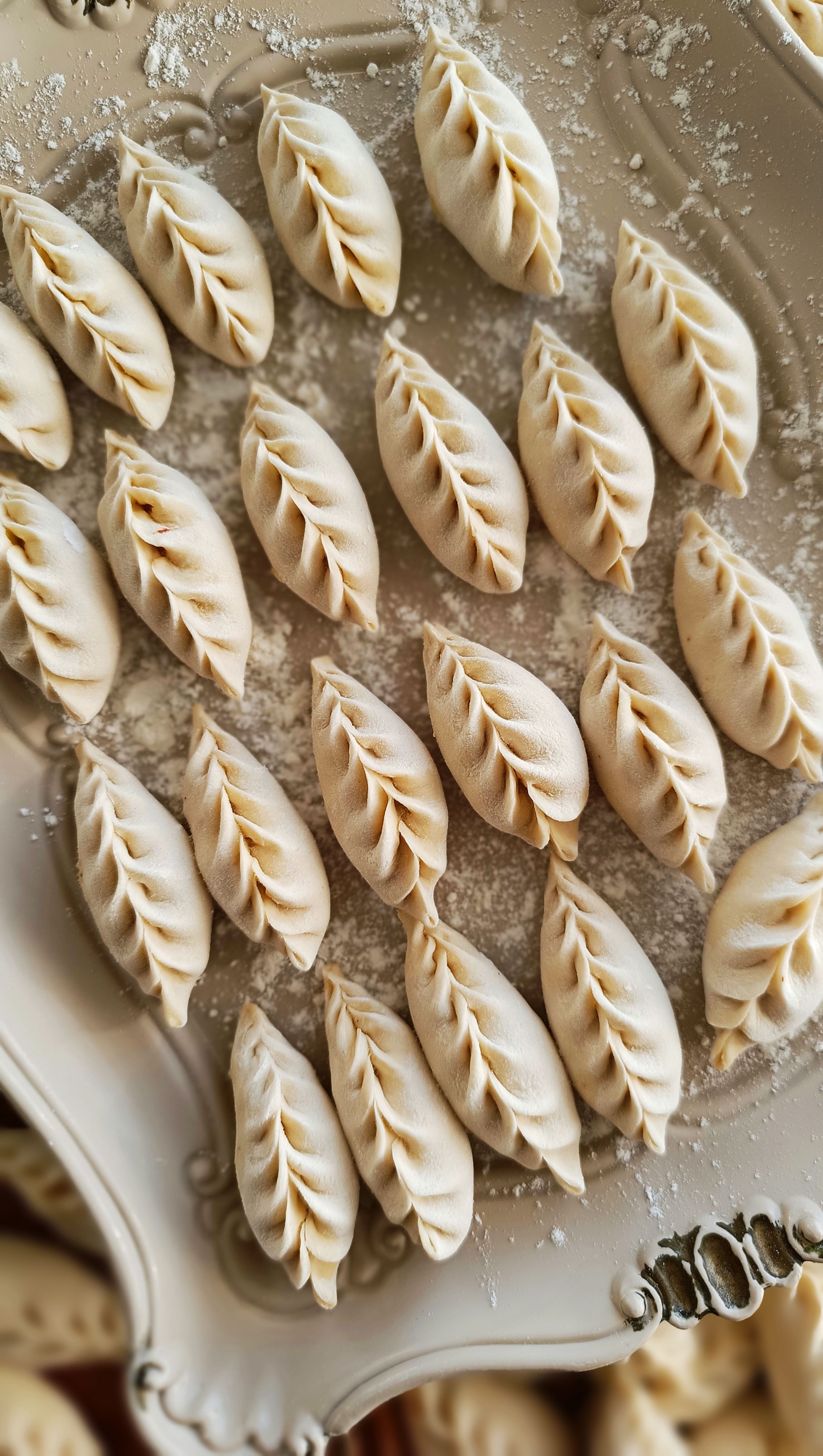 Close-up of Traditional Dumplings on Decorative Plate · Free Stock Photo
